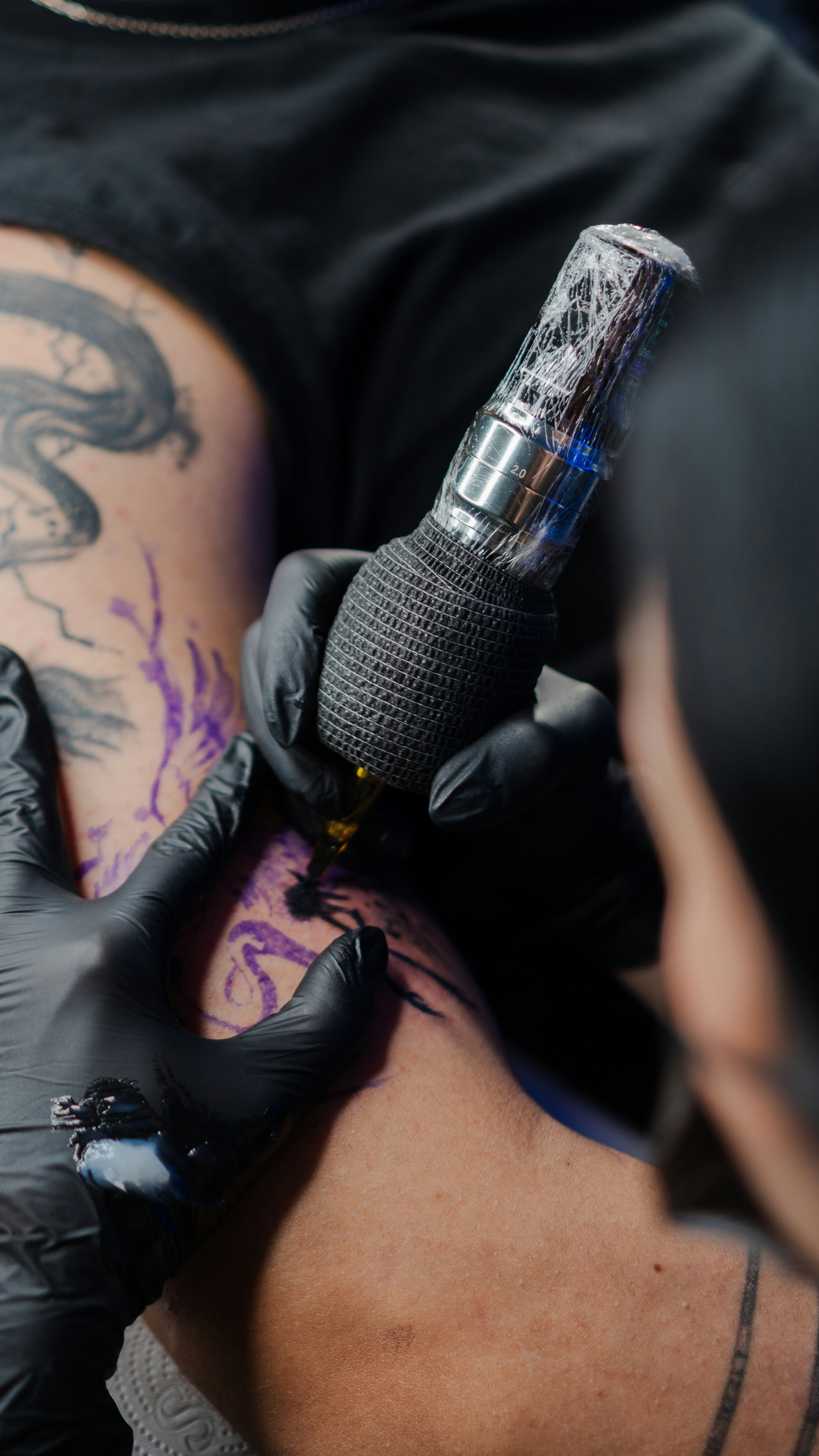 Needle and Ink: Crafting a Tattoo Session Under the Scope