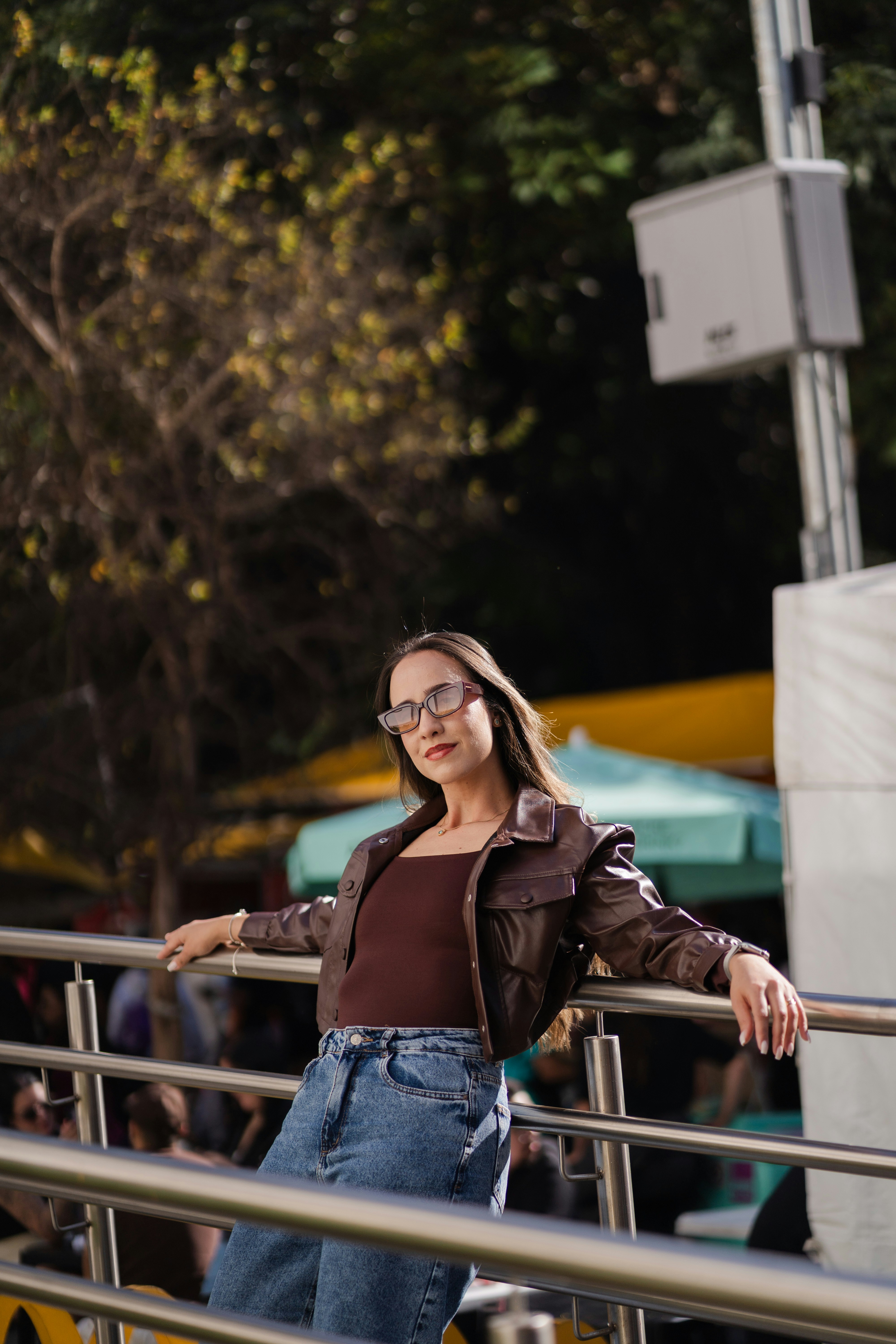 Leaned-Back Confidence: A Casual Portrait at the Outdoor Market