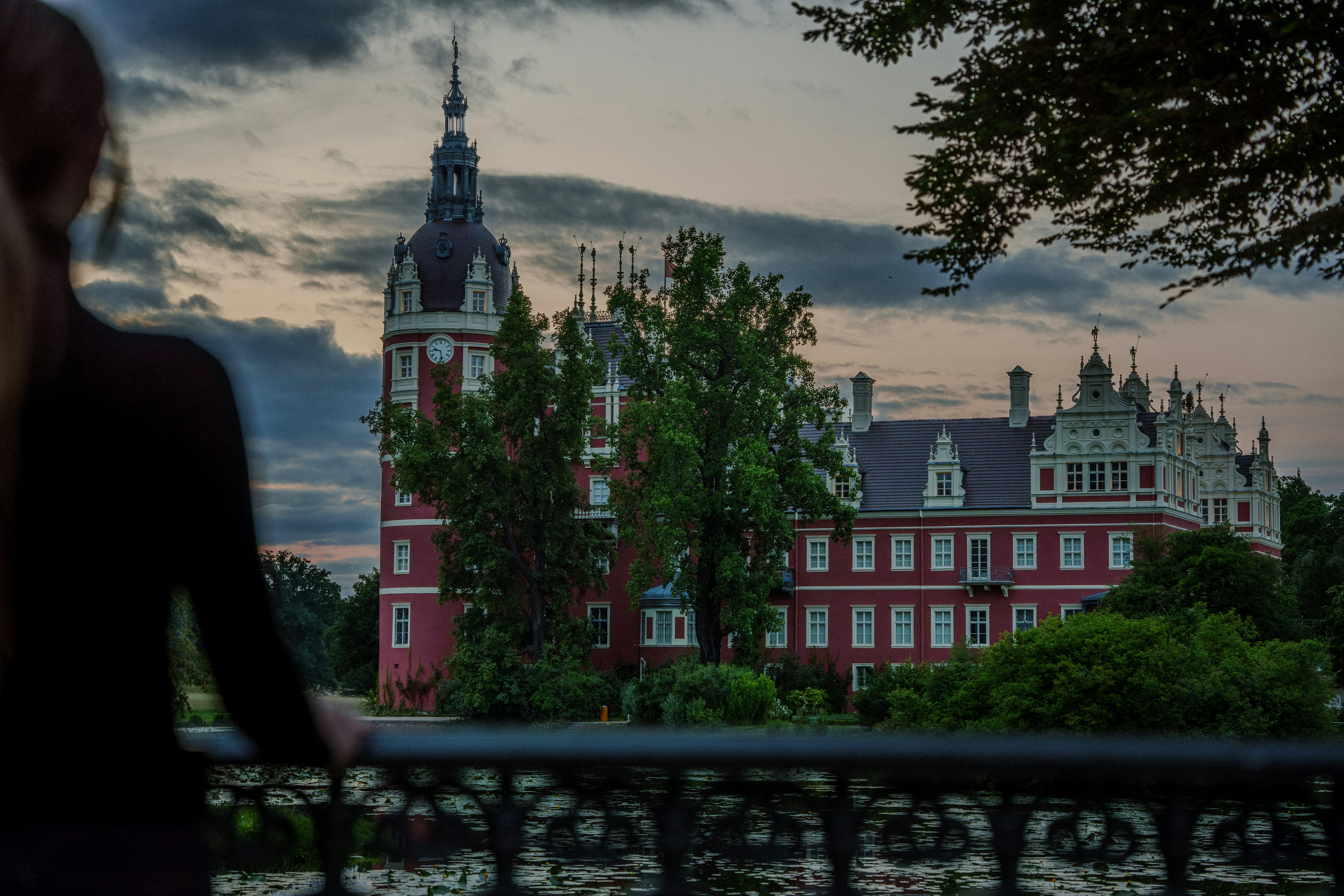 Castle on the Riverside: A Quiet Moment by the Blooming Riverbank