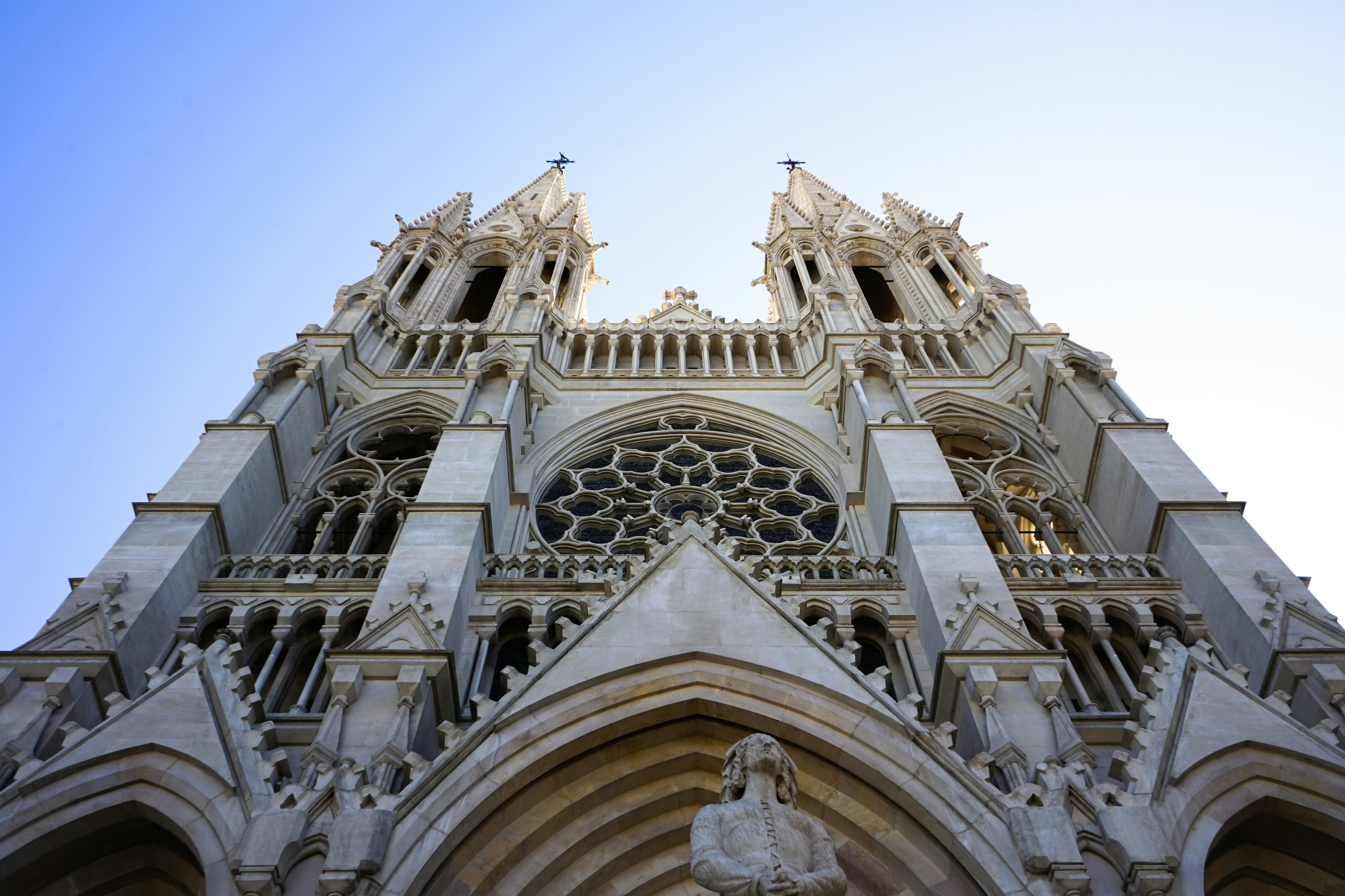 Gothic Facade Ascending: Stone Towers Framing the Sky