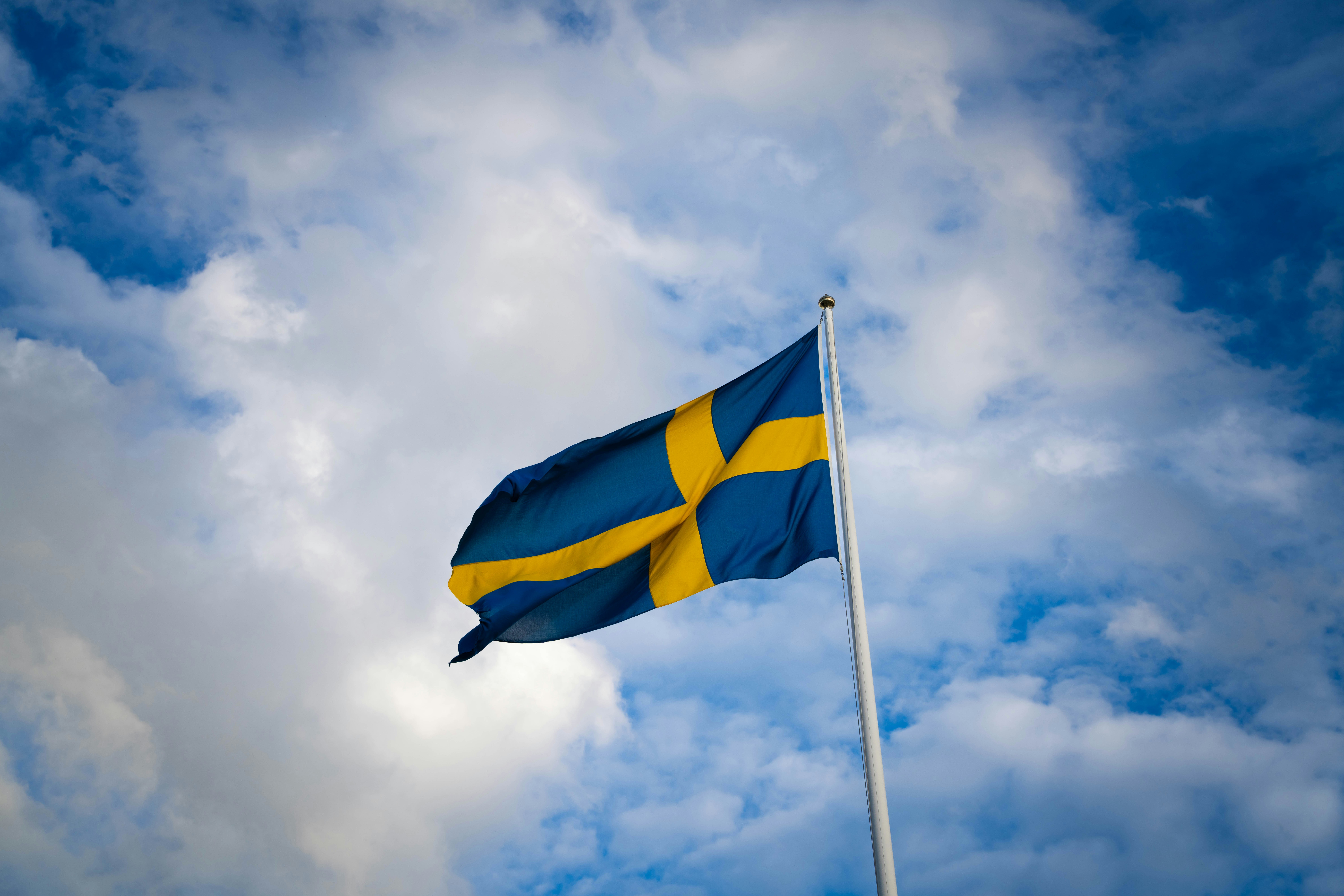 Flag Above the Clouds: Sweden’s Emblem Aloft