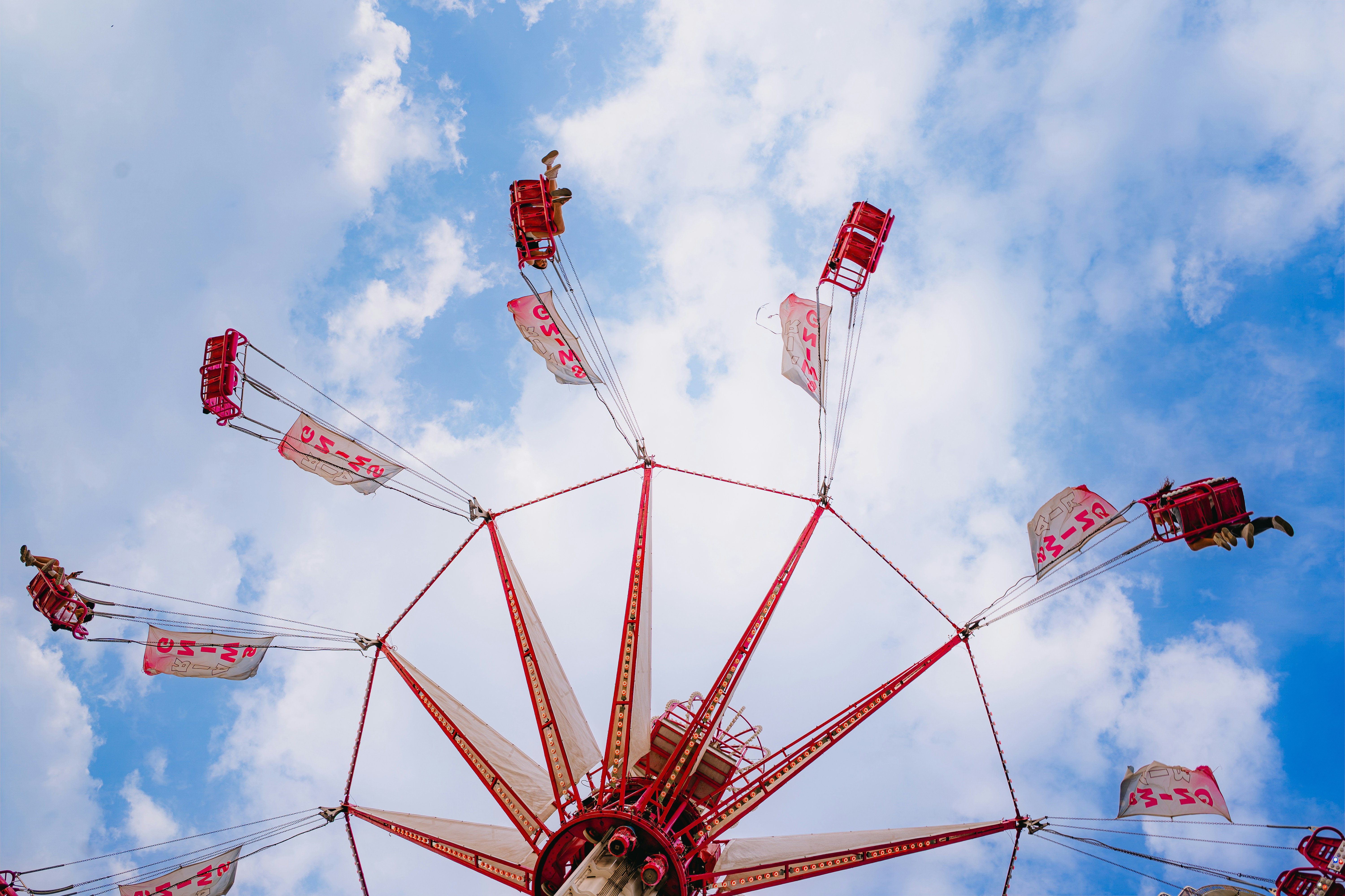 Skyward Carousel: Ferris Wheel Framing the Sky