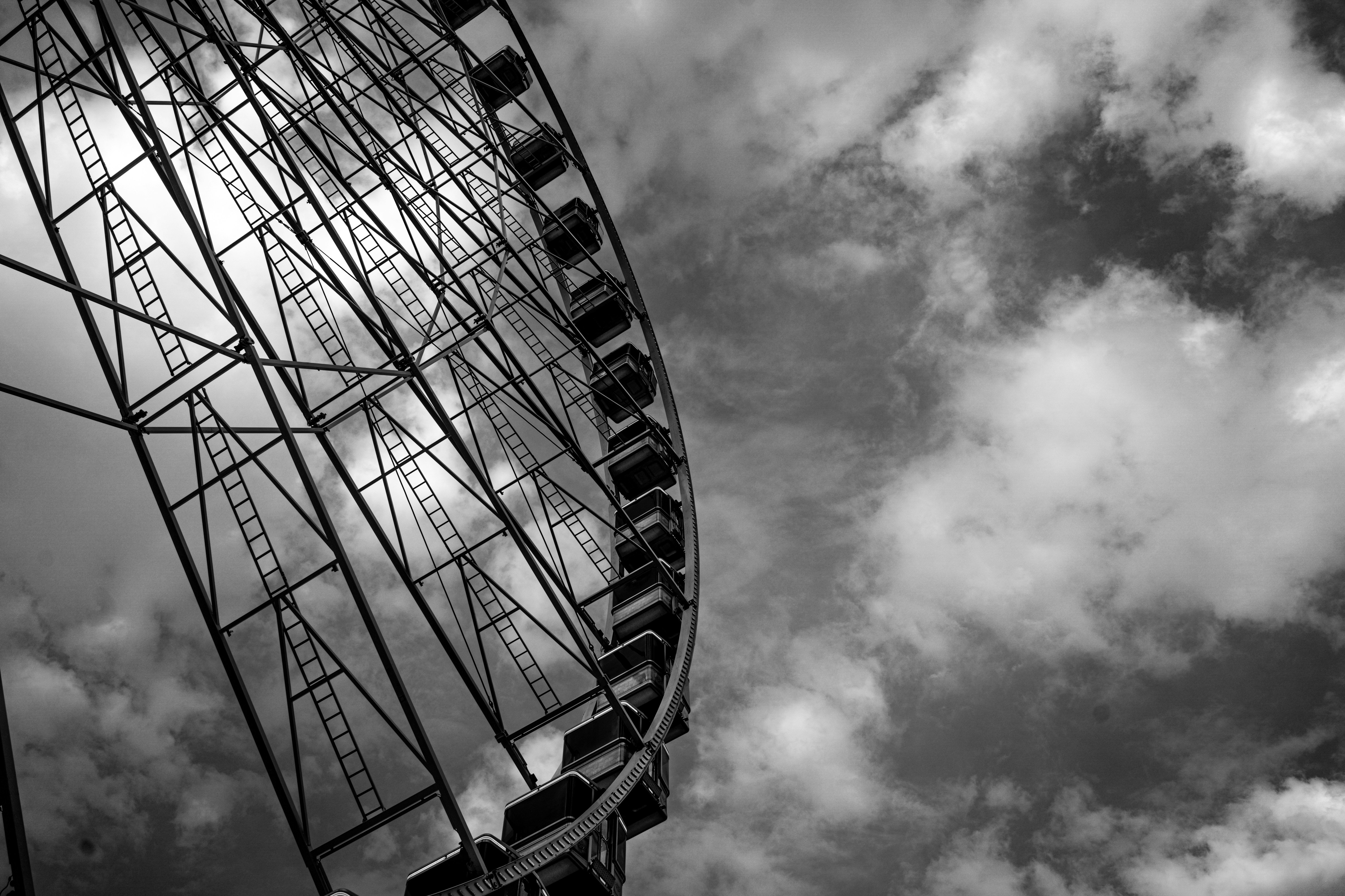 Perspective of a Ferris-Wreed Structure against a Streaked Sky