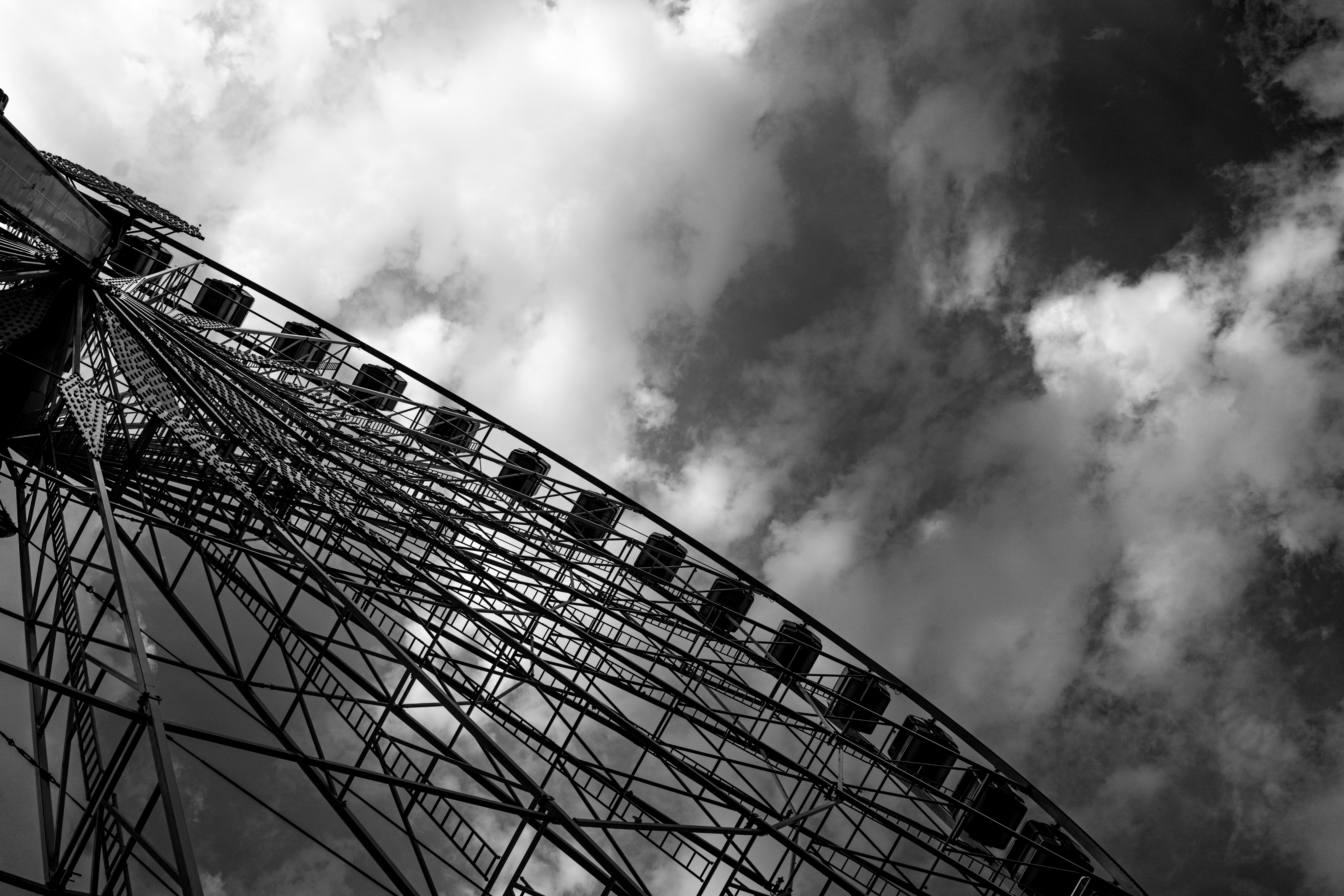 Iron Lattice Cirque: A Tilted Wheel Against the Sky