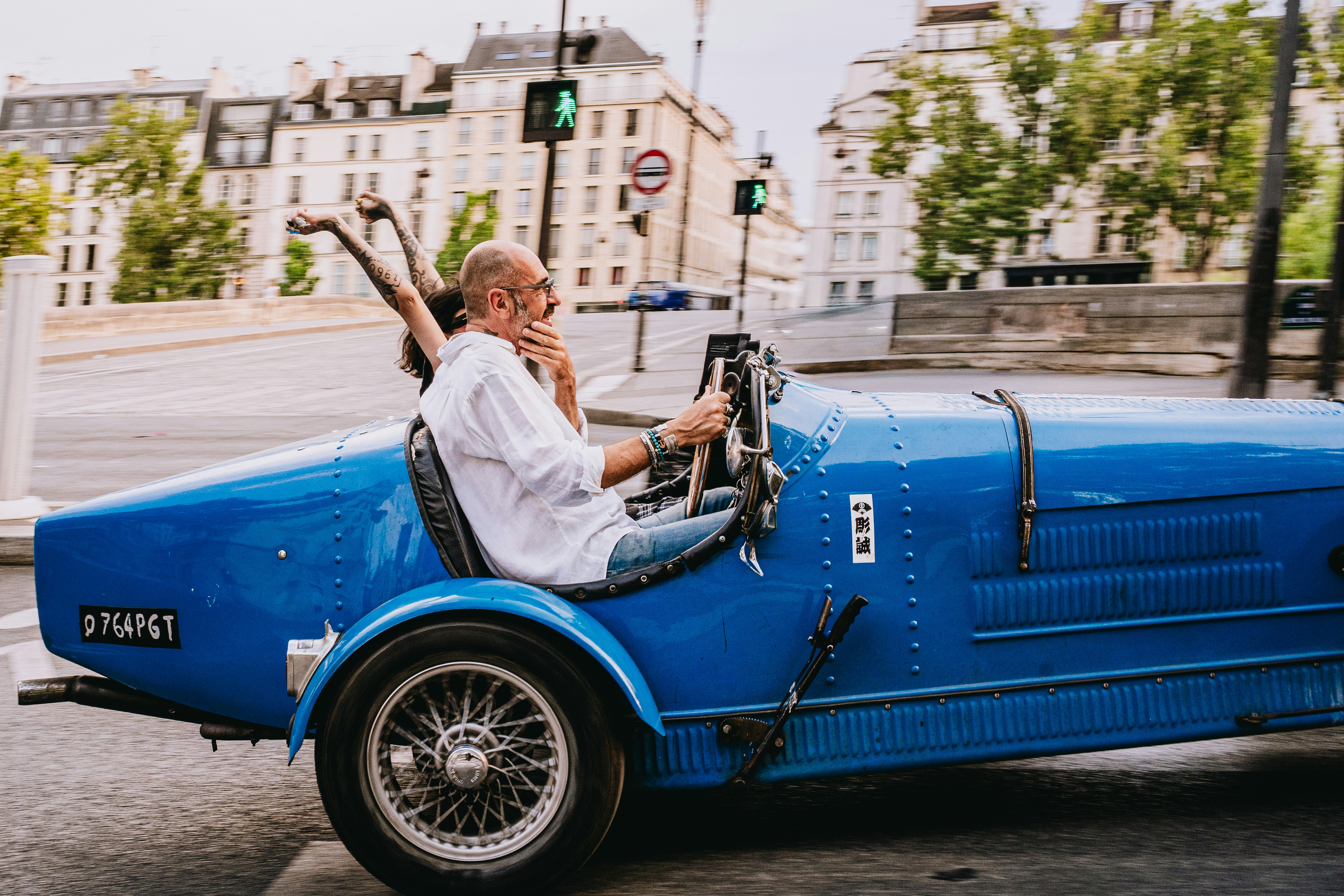 Blue Streak: A Vintage Convertible in a Parisian Moment
