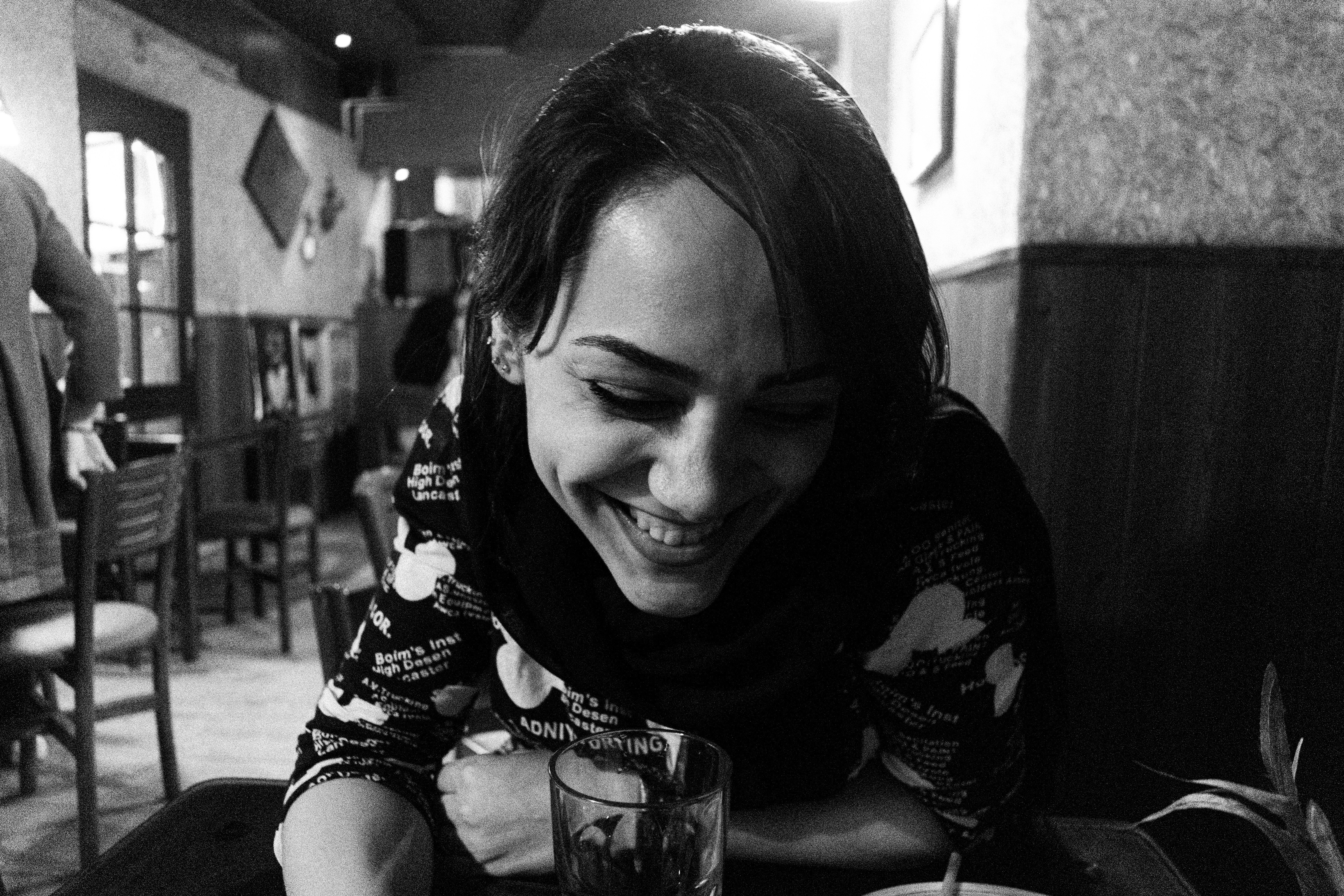 Smiling Conversations at a Cozy Café