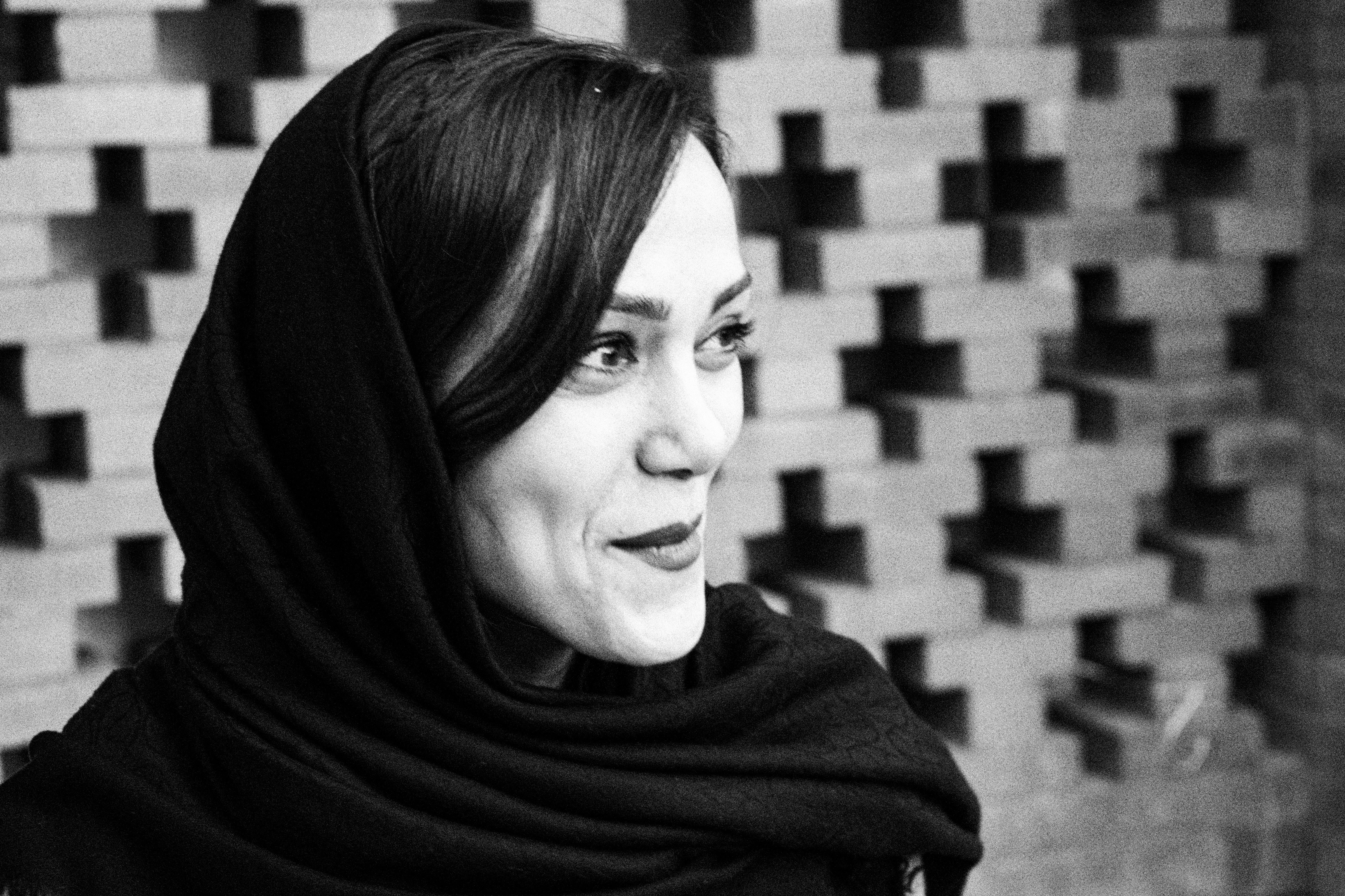 Portrait in Quiet Light: The Subtle Smile of a Veiled Moment
