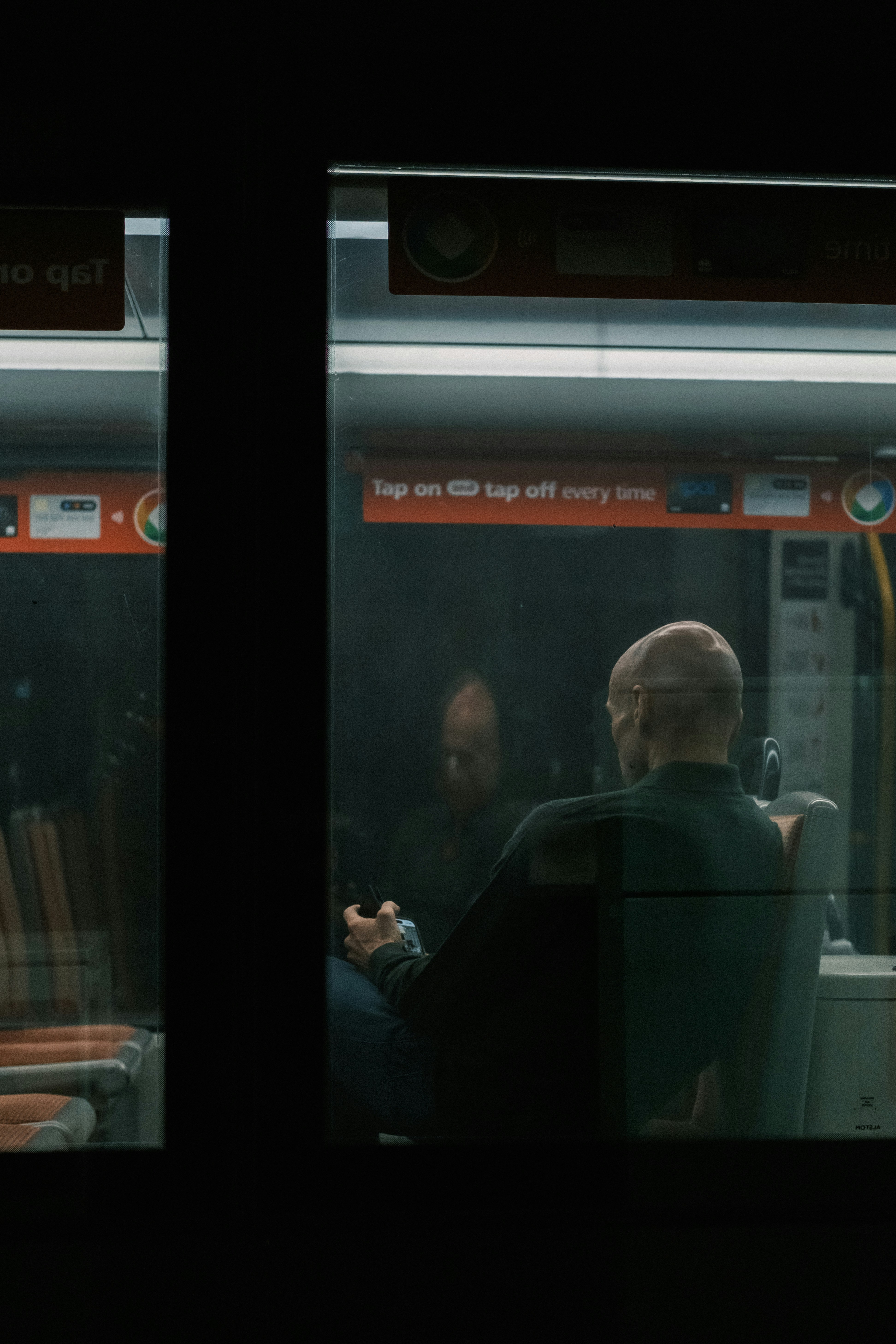 Midscene Quiet: A Passenger in the Subway Car Embraces the Moment