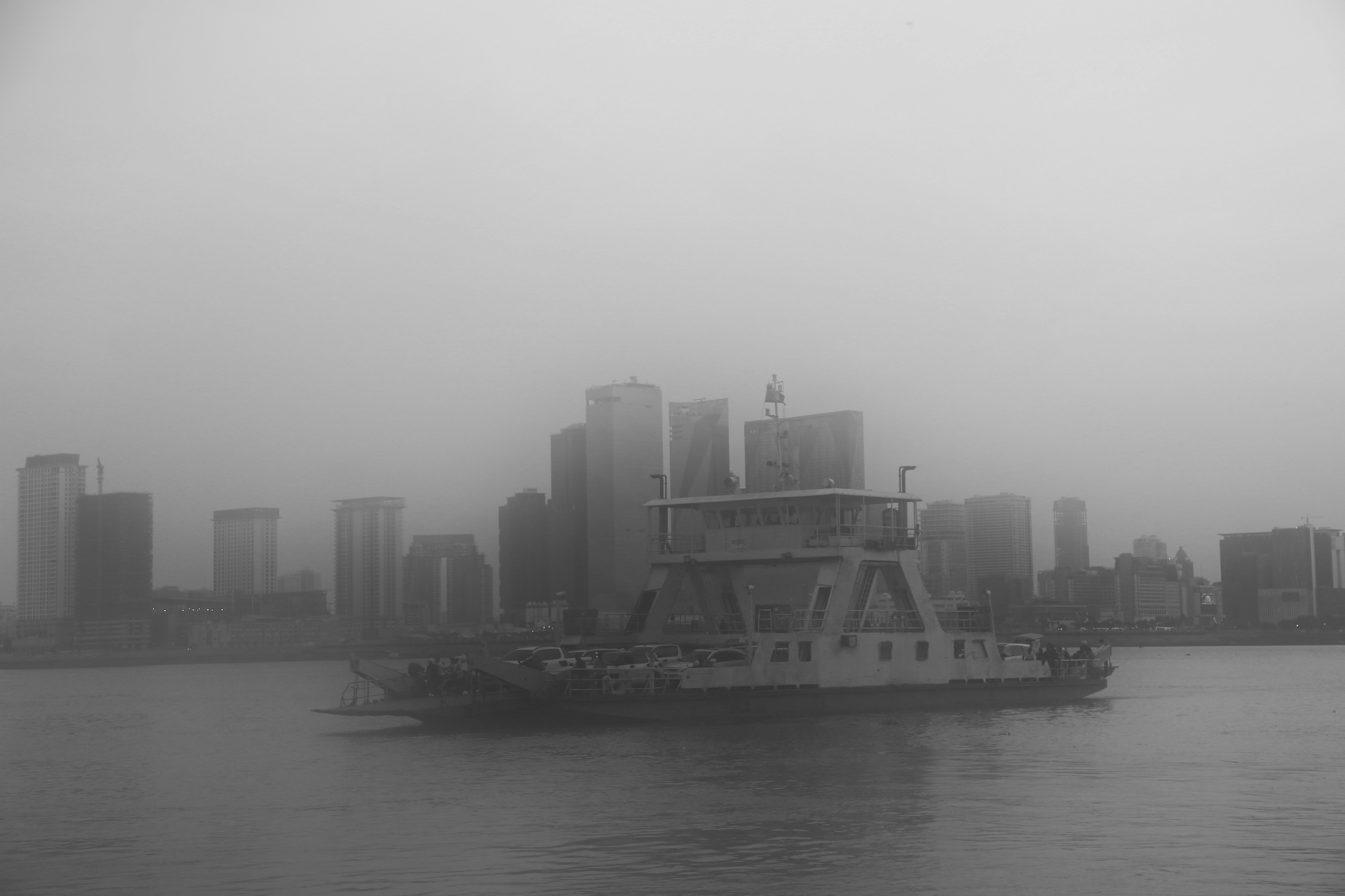 Mist over the Floating City: A Quiet Harbor in Gray