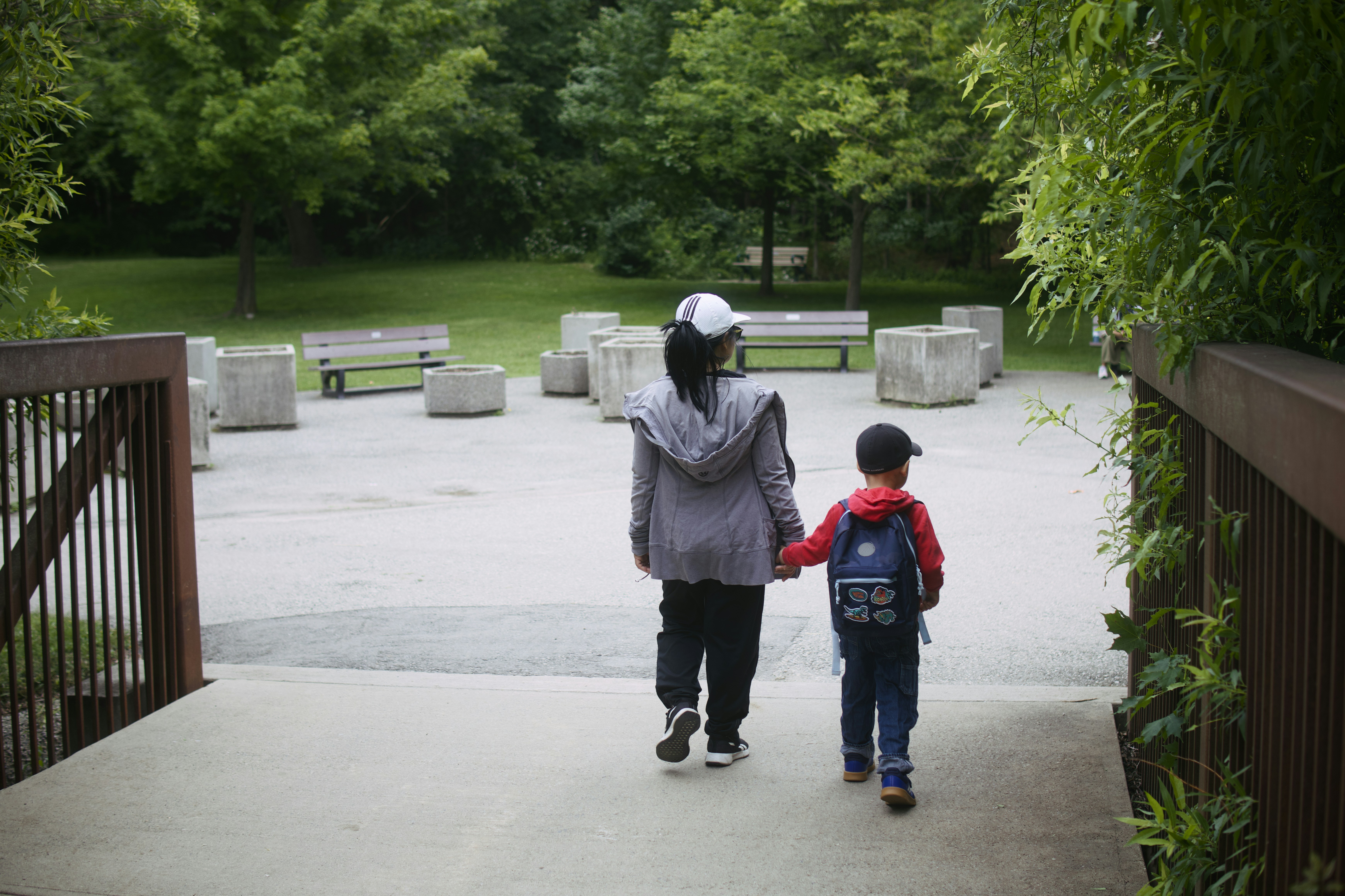 Holding Hands into the Park: A Quiet Walk Between Two Friends