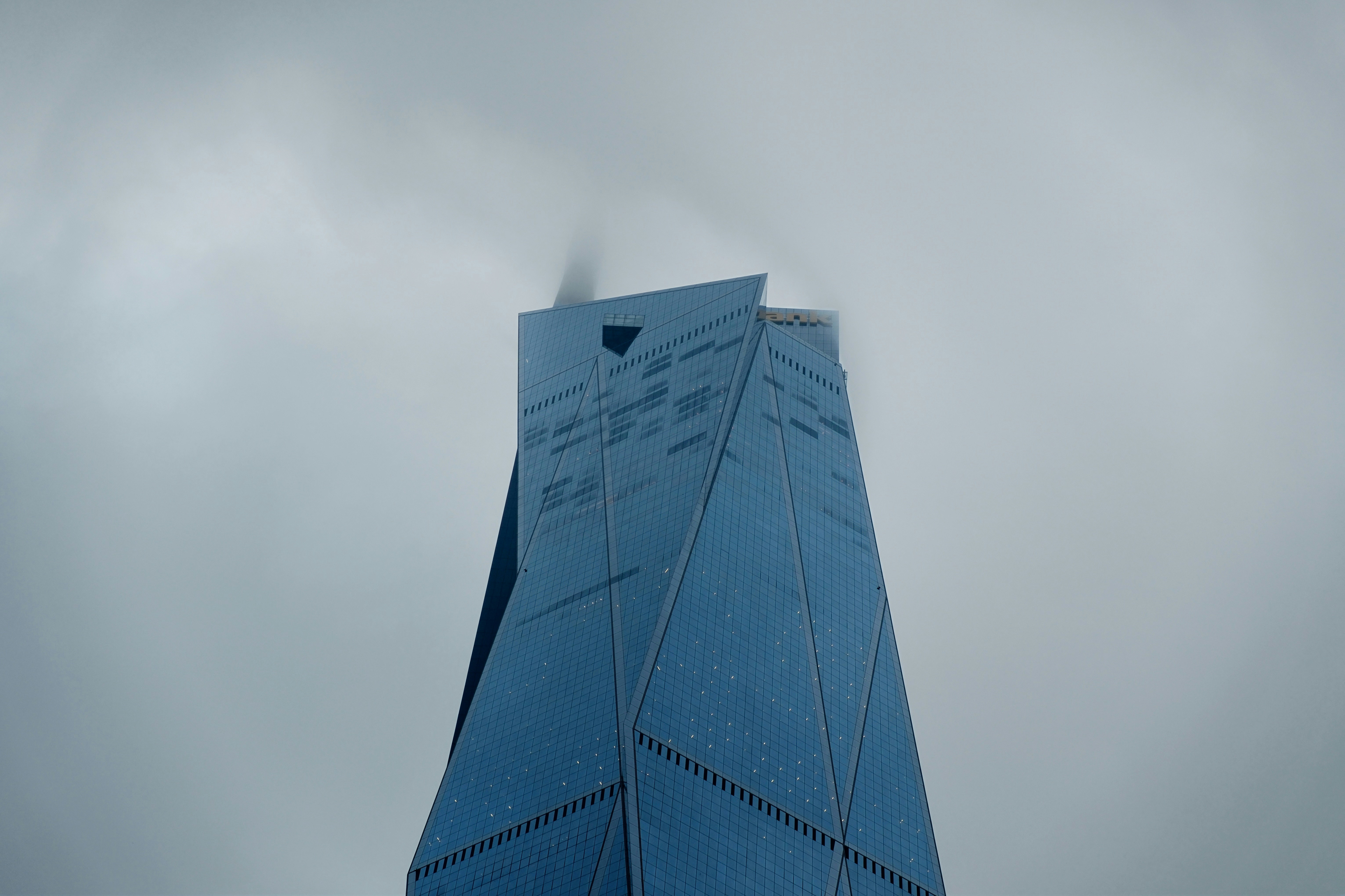 Blue Pyramid: The Spire of Clouds Reaching Toward Rain