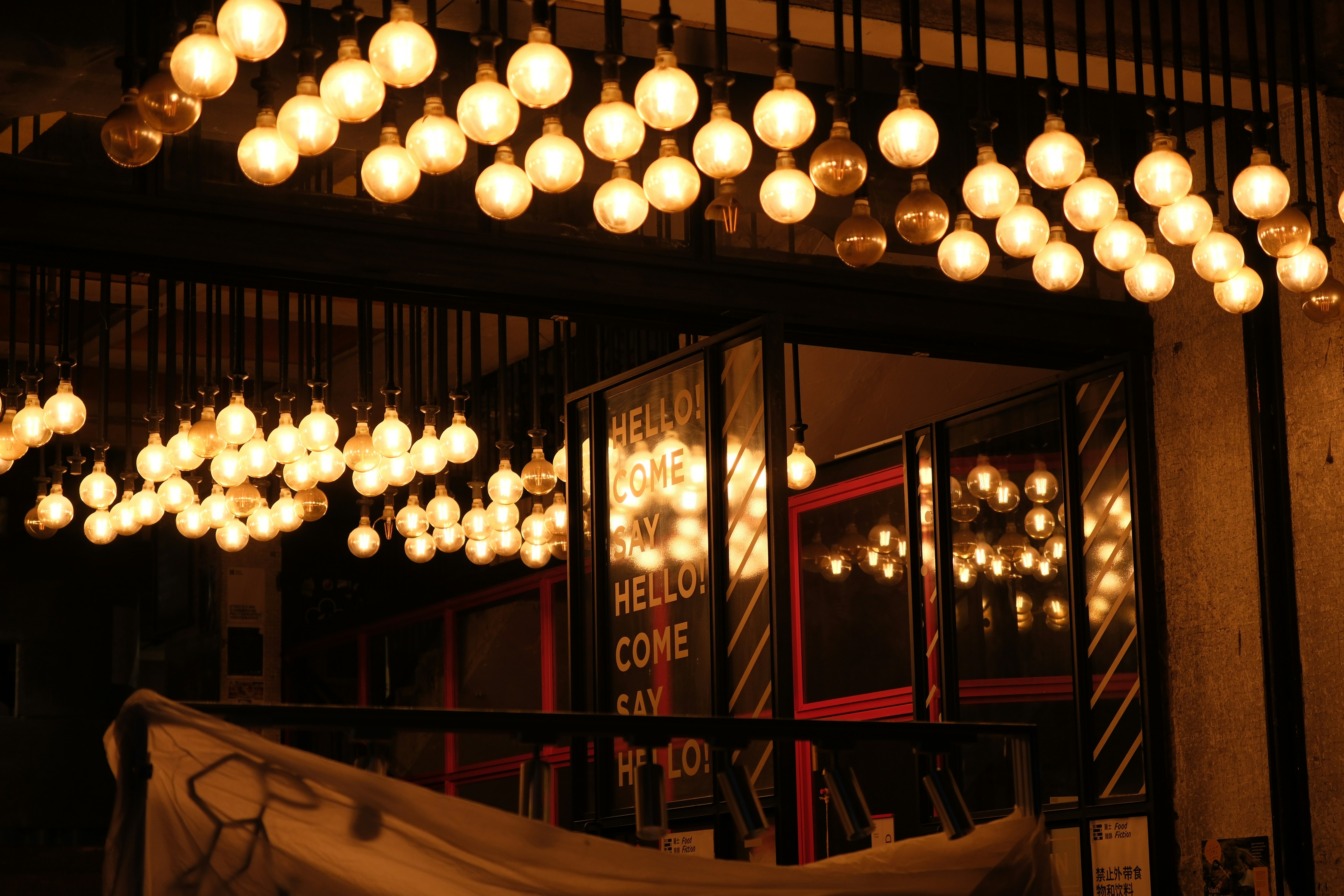 Warm Lanterns Over a Nighttime Interior