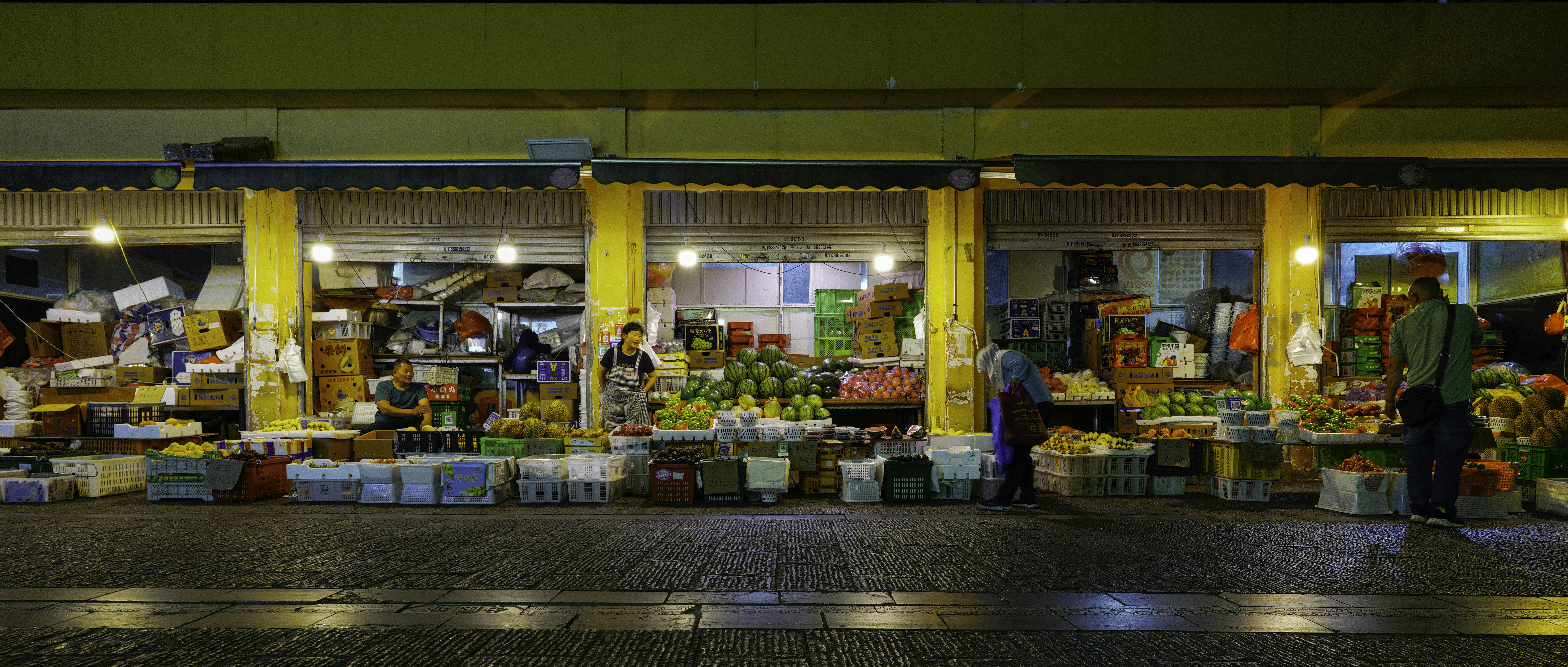 Market Stalls Under Neon Glow