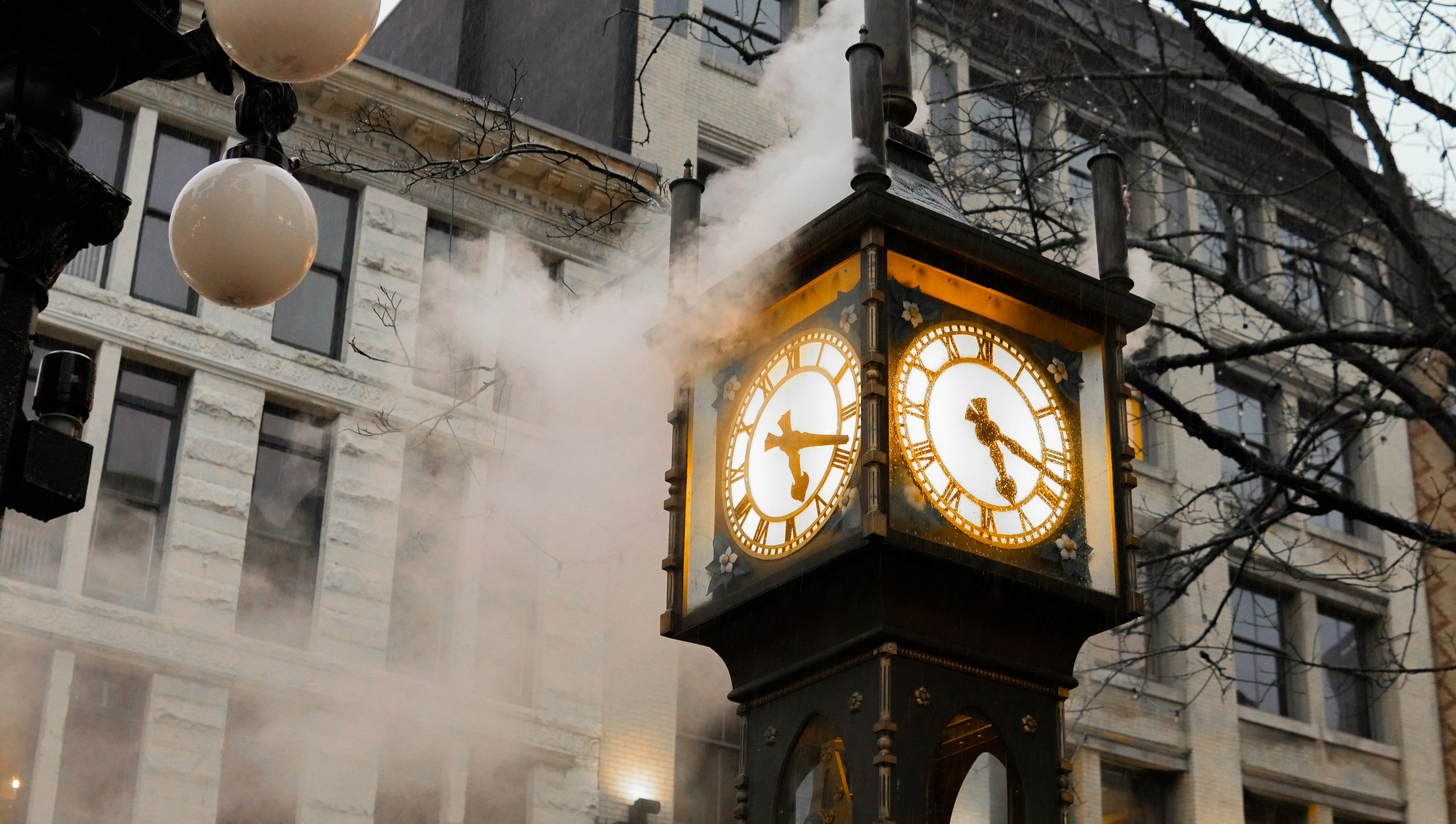 Steam and Time: The Glowing Clock in a Misty City Square