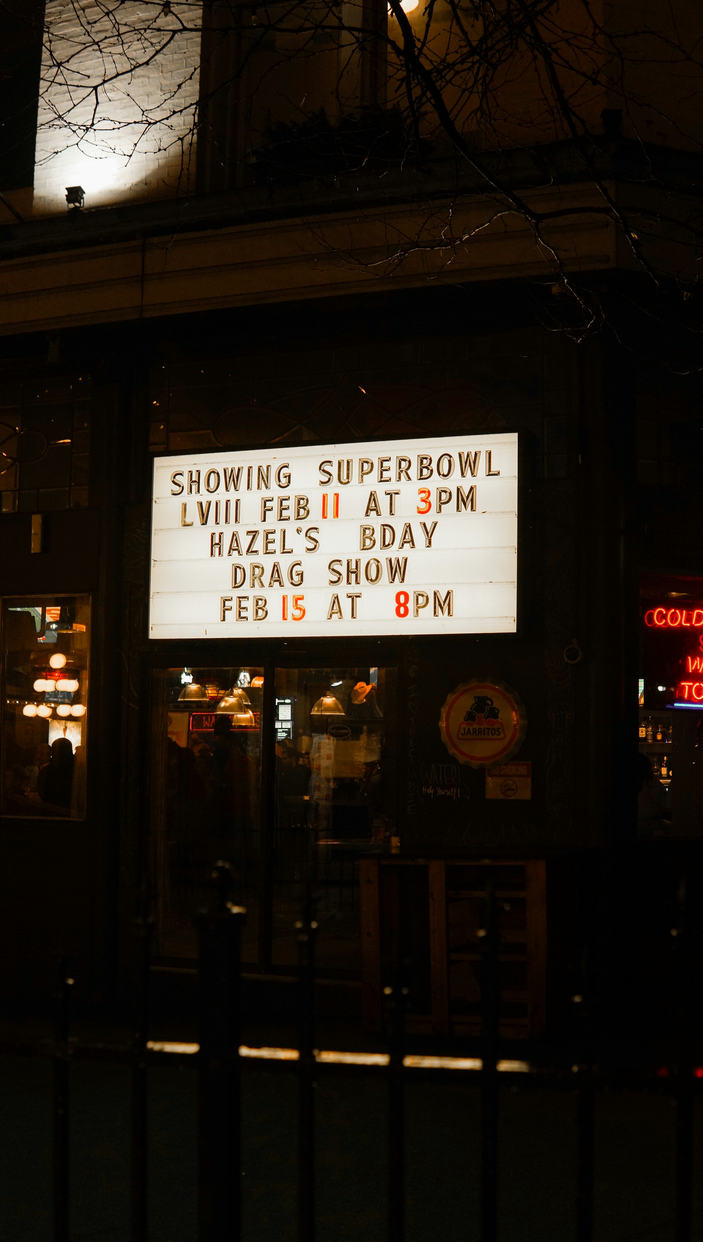 Neon Signboard in Velvet Night: A Barfront Telegraph
