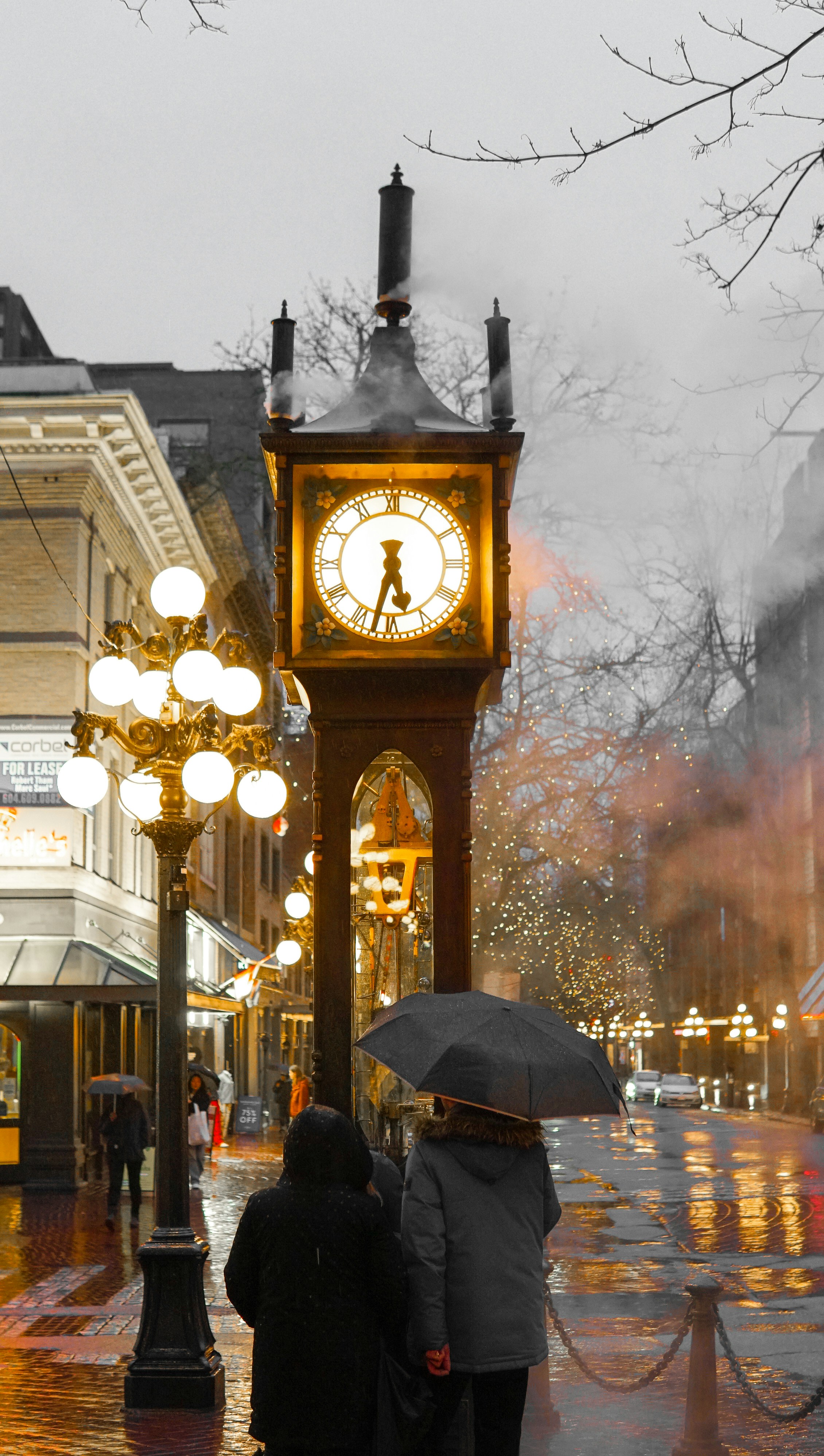 Steam in the Clock: Winter Rain on a City Lane