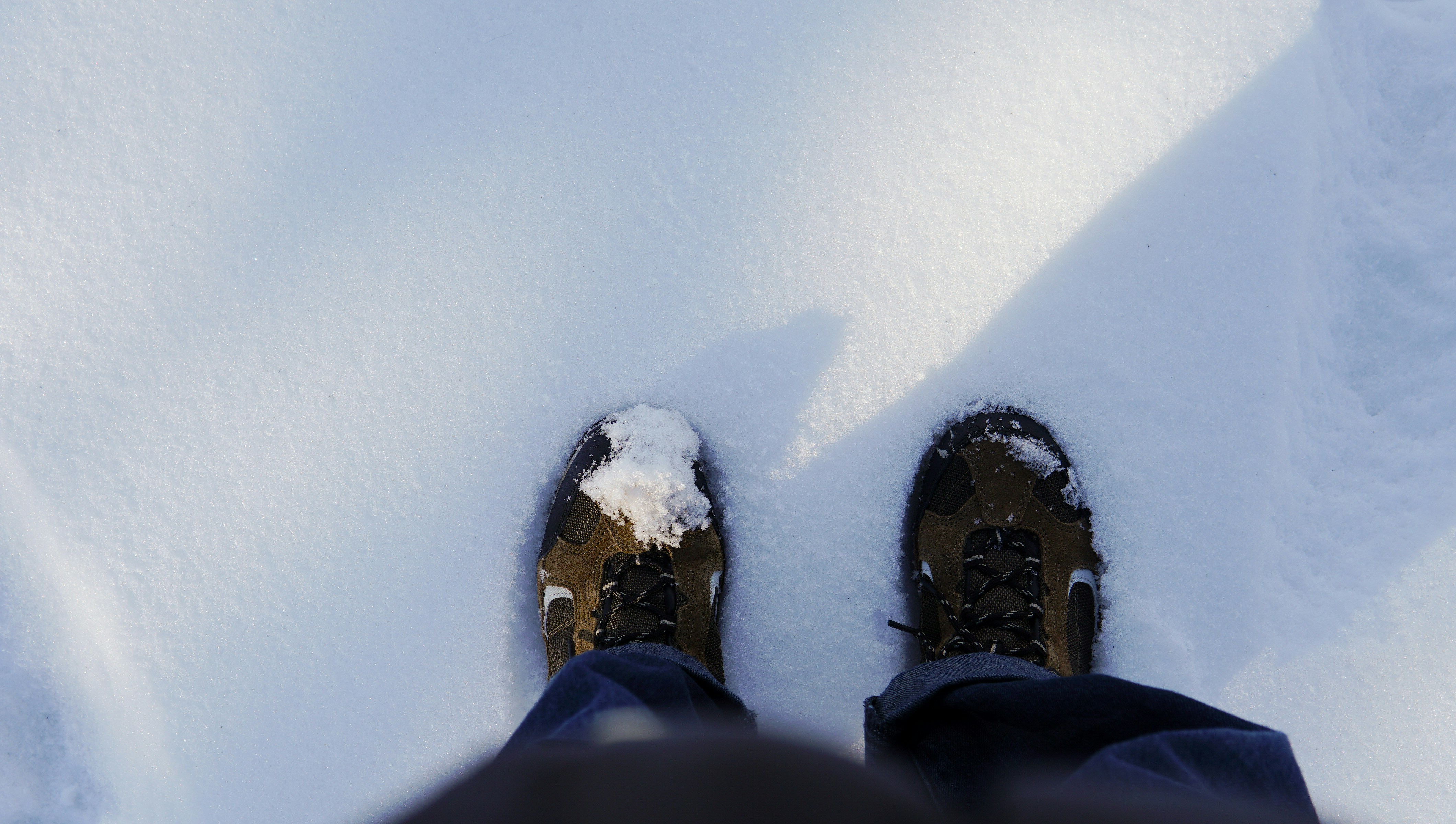 Booted Steps into Fresh Snow