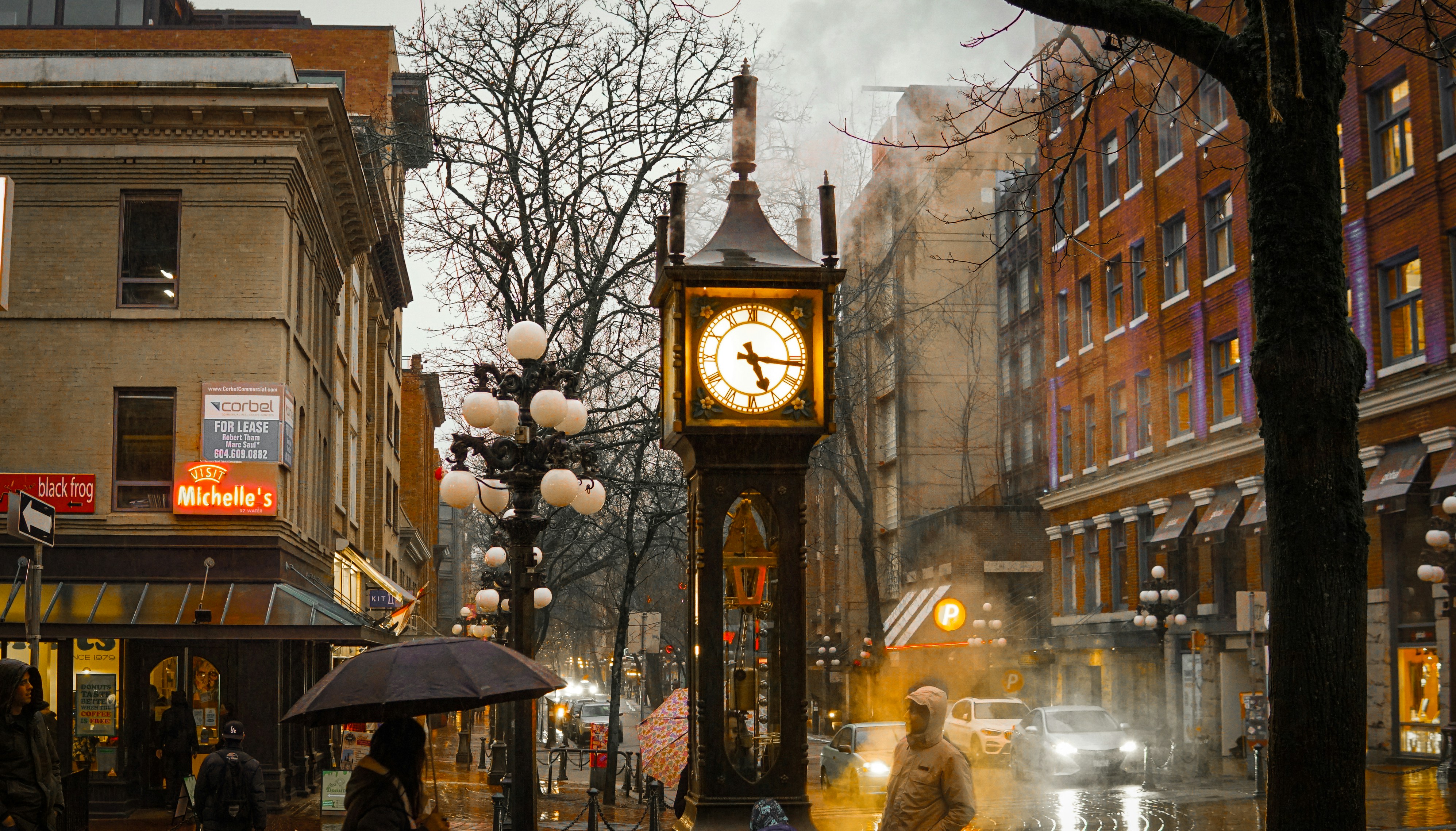 Clock Tower in Rain-Slicked Main Street