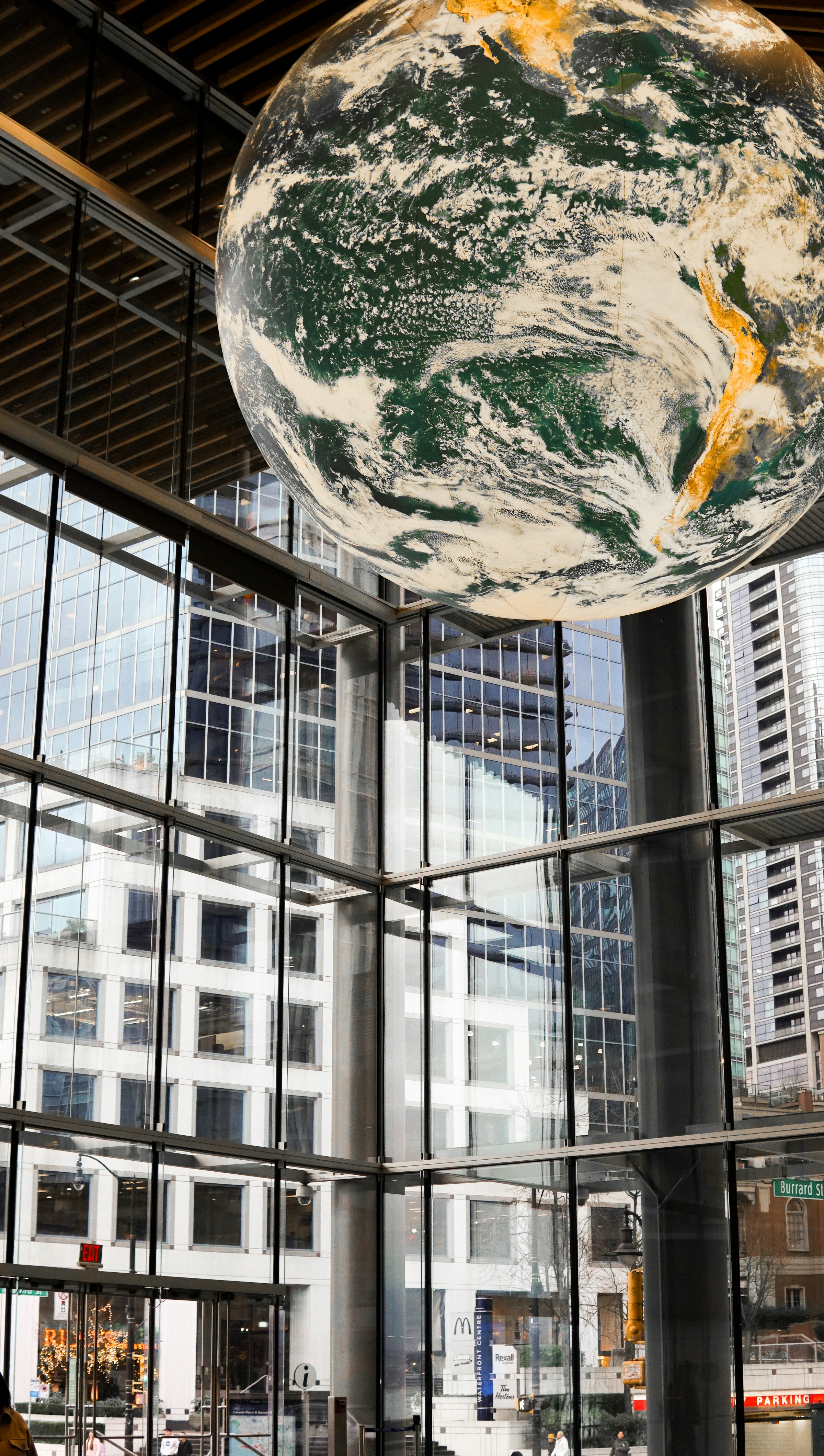 Earth in the Sky: Globe Suspended Above a Modern City Atrium