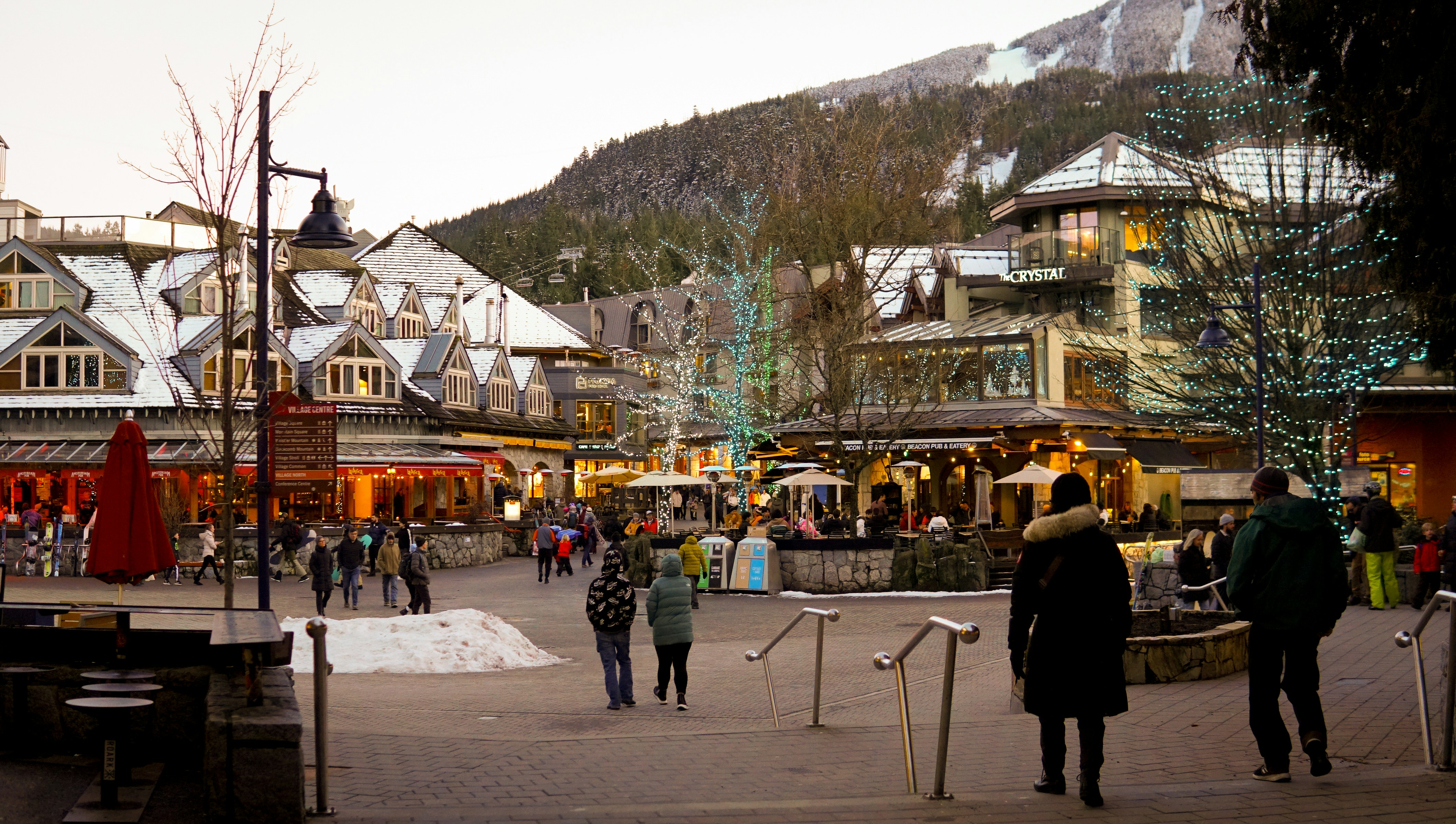 Twilight Market in a Snow-Dusted Alpine Village