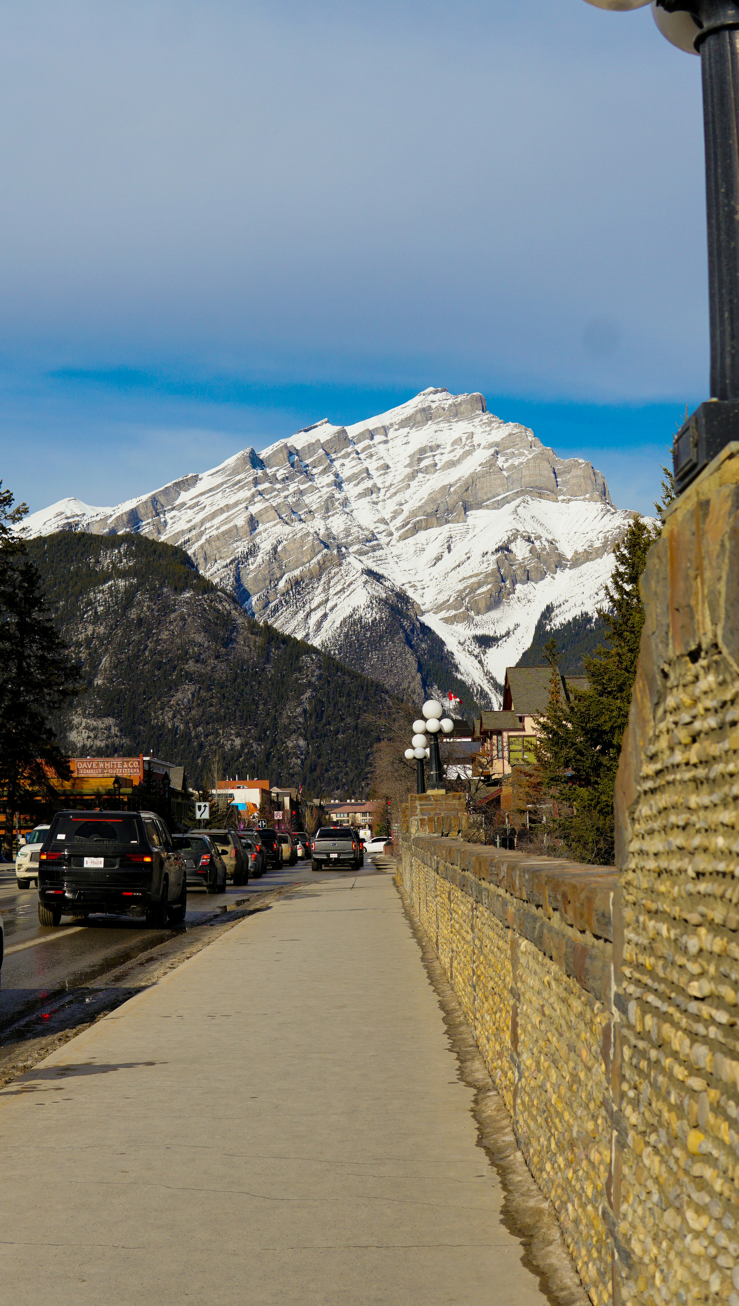 Snow-capped Peaks Over a Quiet Mountain Town Street