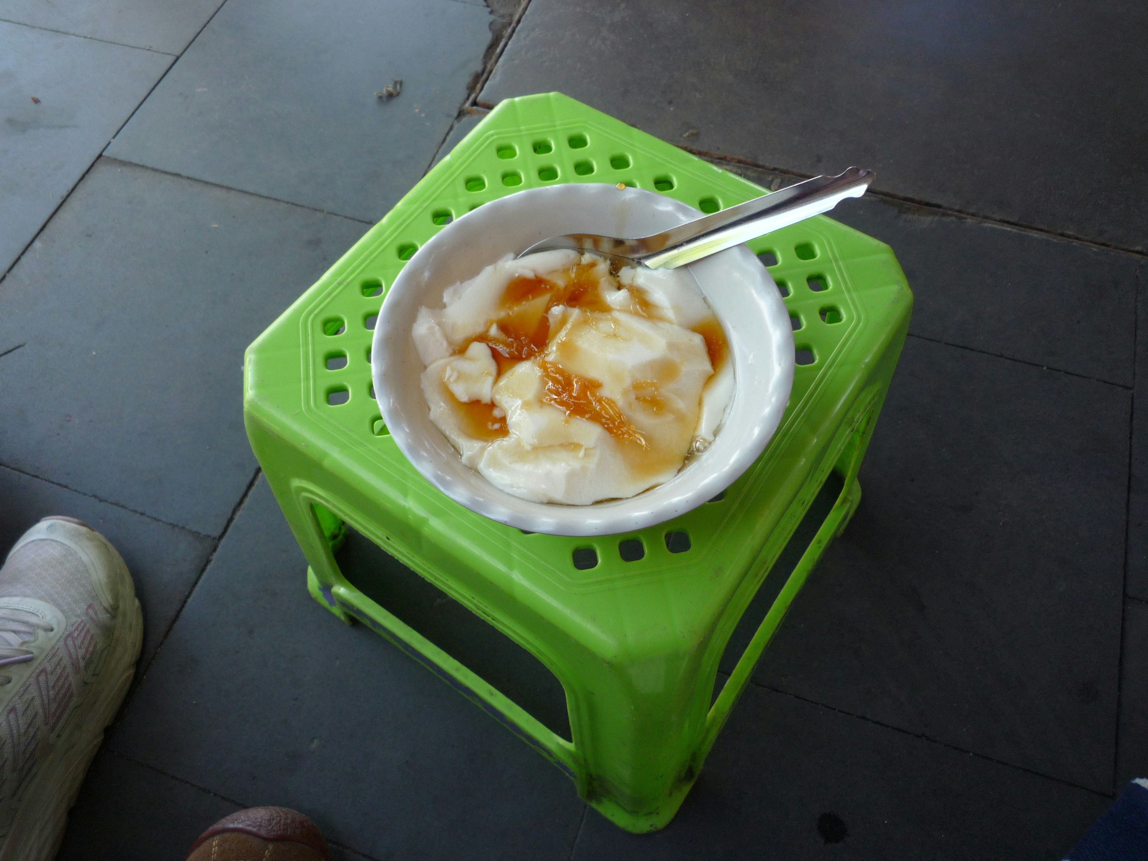 Ice Cream Sundae on a Bright Green Stool: Everyday Snack Scene