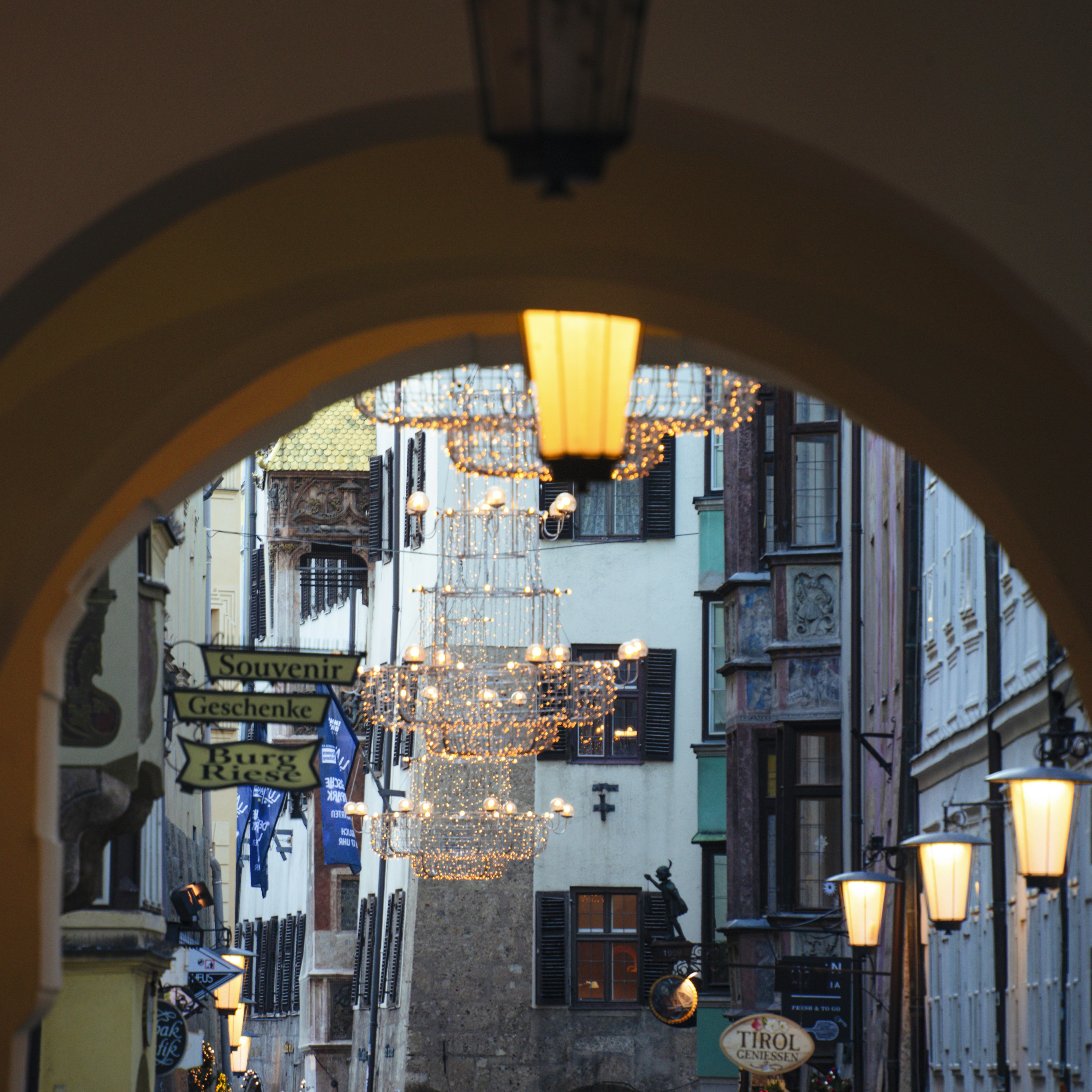 Lantern-lit Arcades: A Quiet Street in Twilight