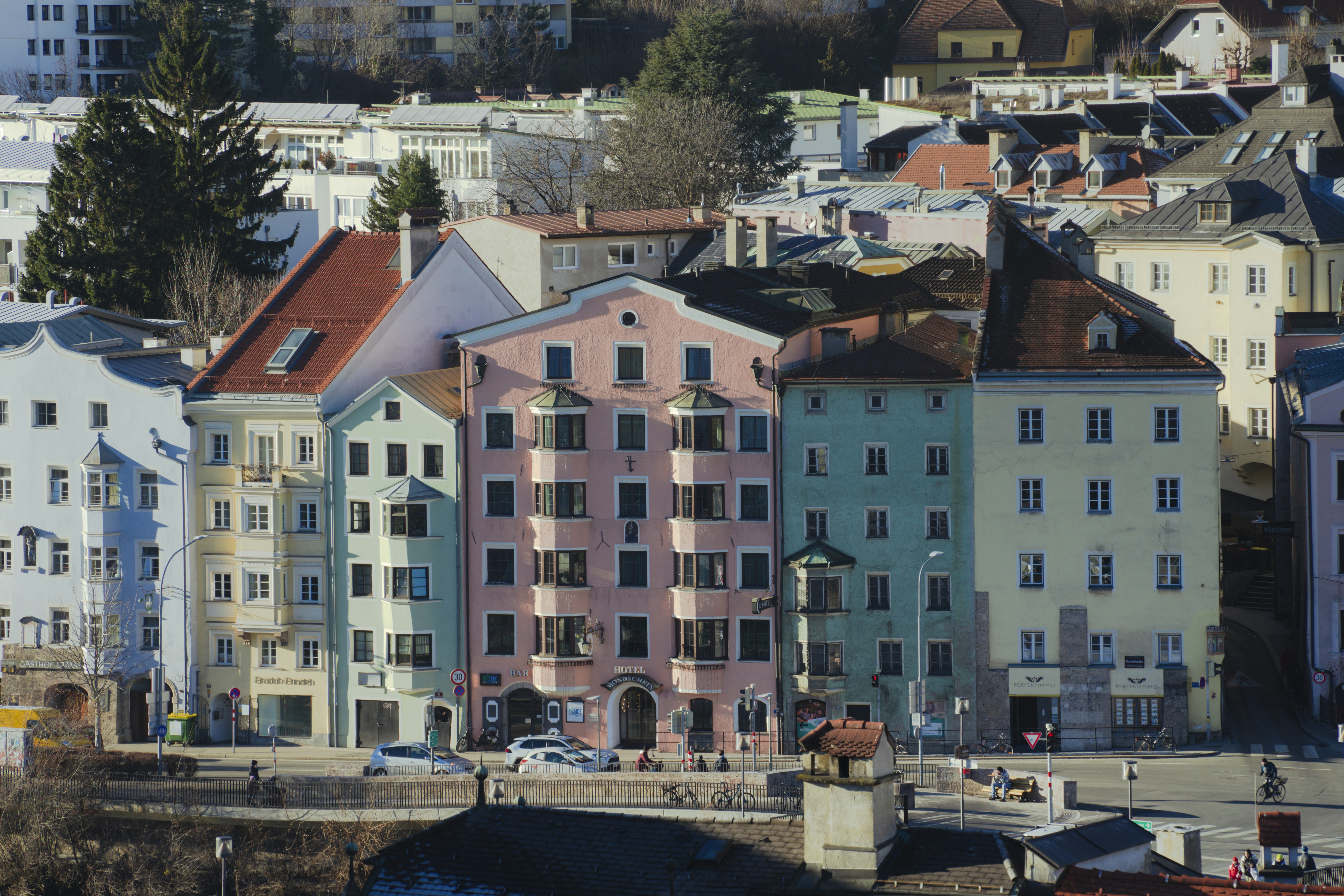 Pastel Row: A Colorful Waterside Street Embraced by the River