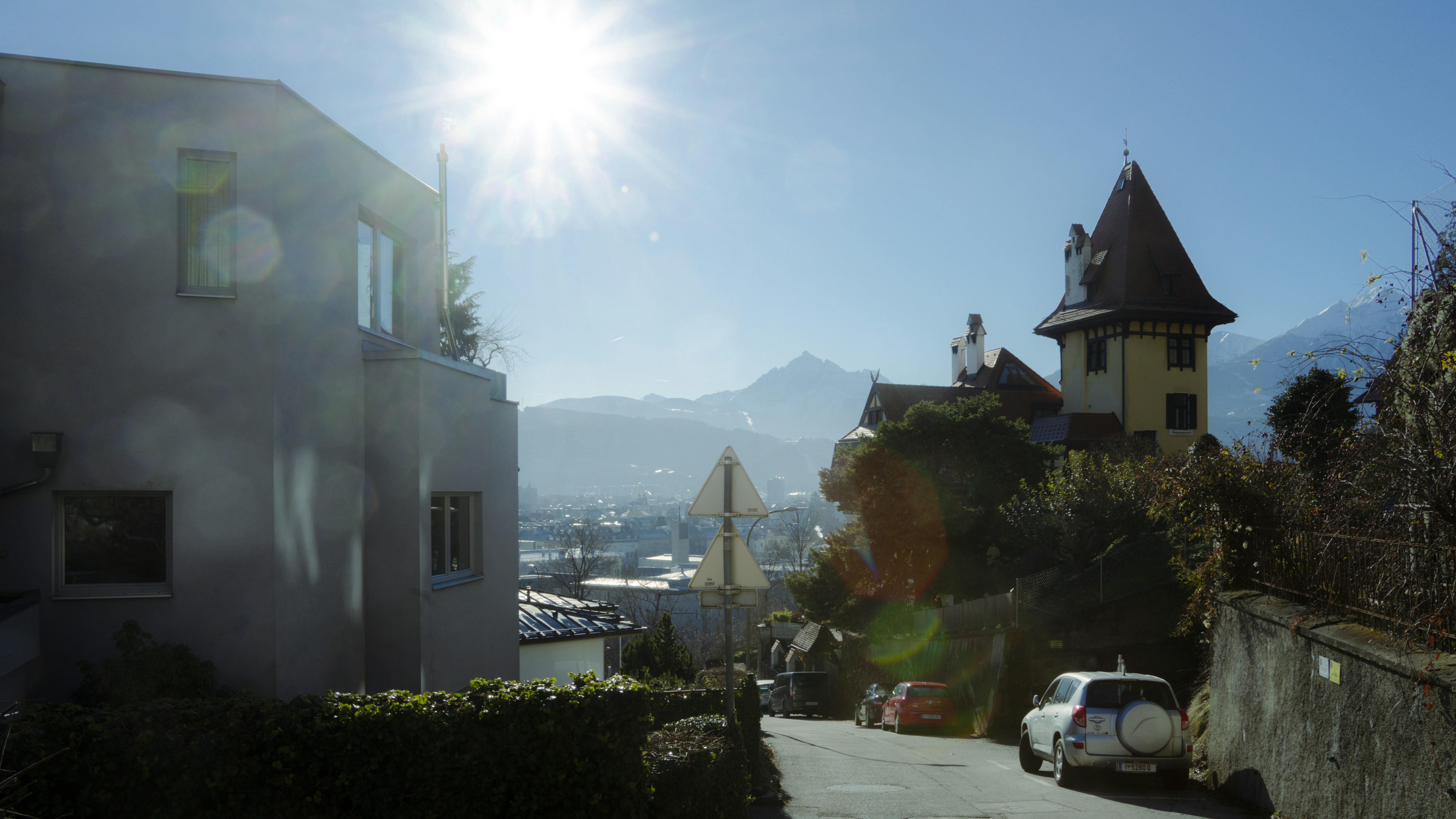 Sunlit Alpine Lane with a Fairytale Turret