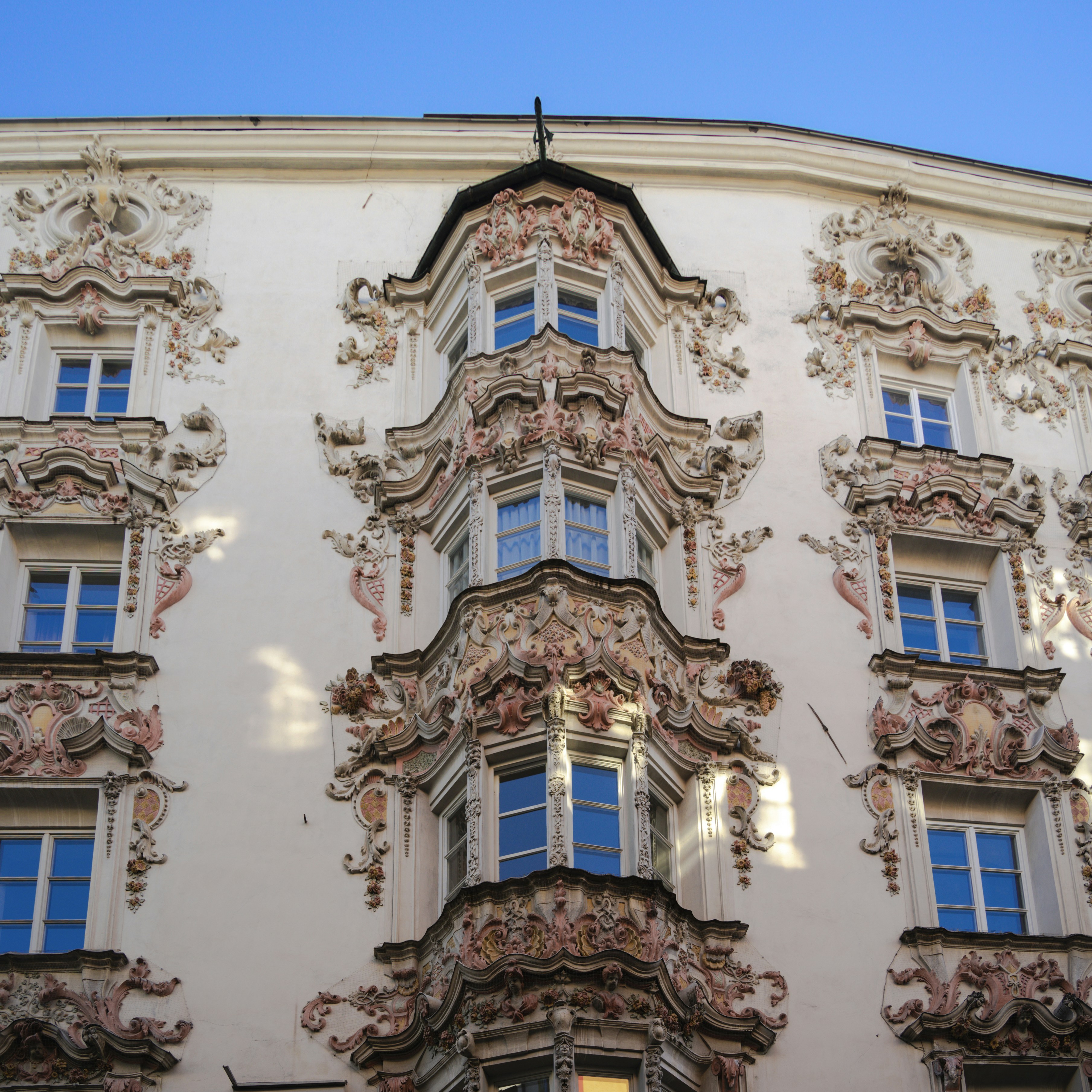 Ornate Facade Rising with the Sunlit Curves
