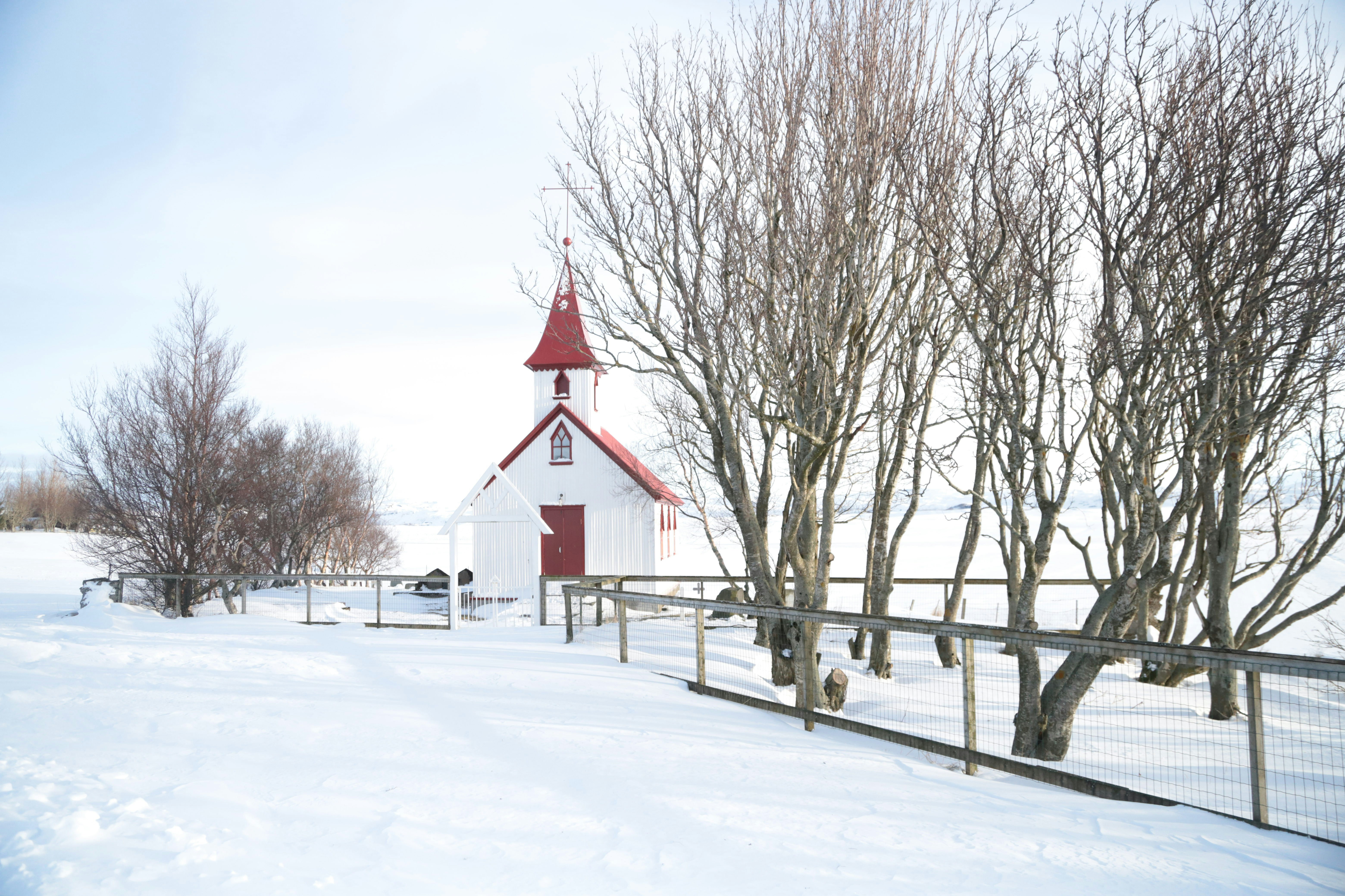 Snowbound Chapel: Red Roof, White Silence