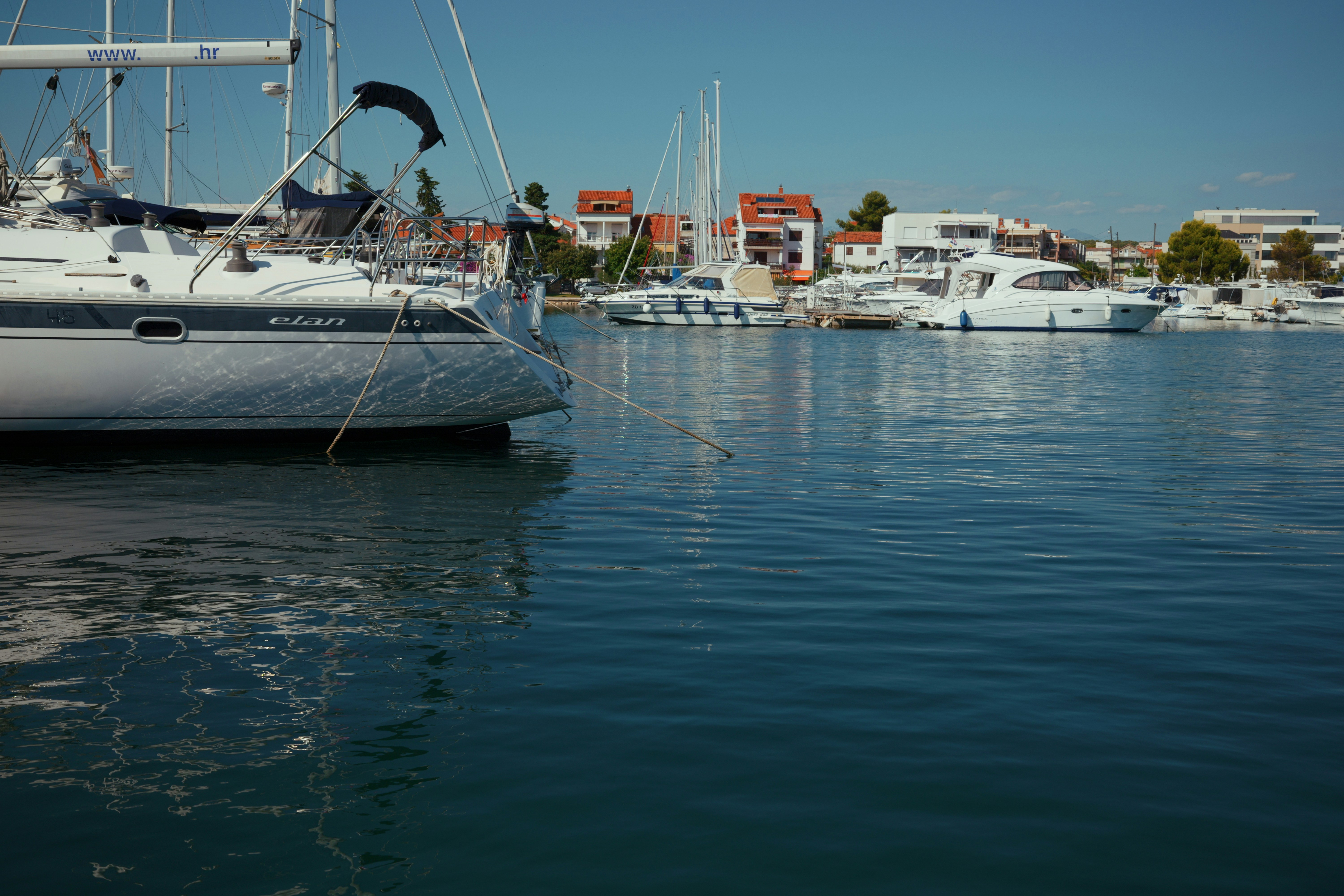 Harbor Silhouettes: Boats Rest at Dusk in a Quiet Marina