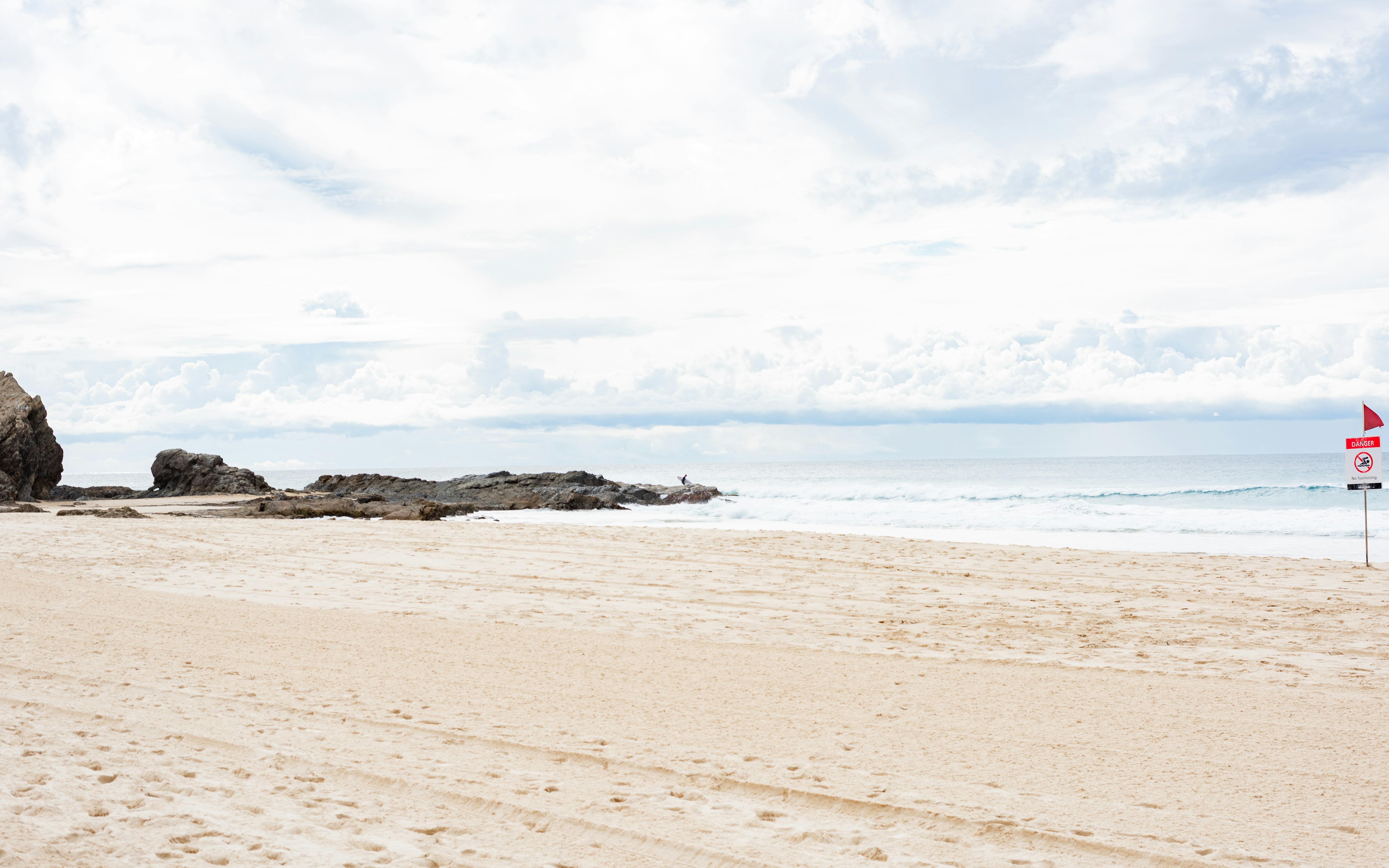 Quiet Coastline: Endless Sand Under Open Sky