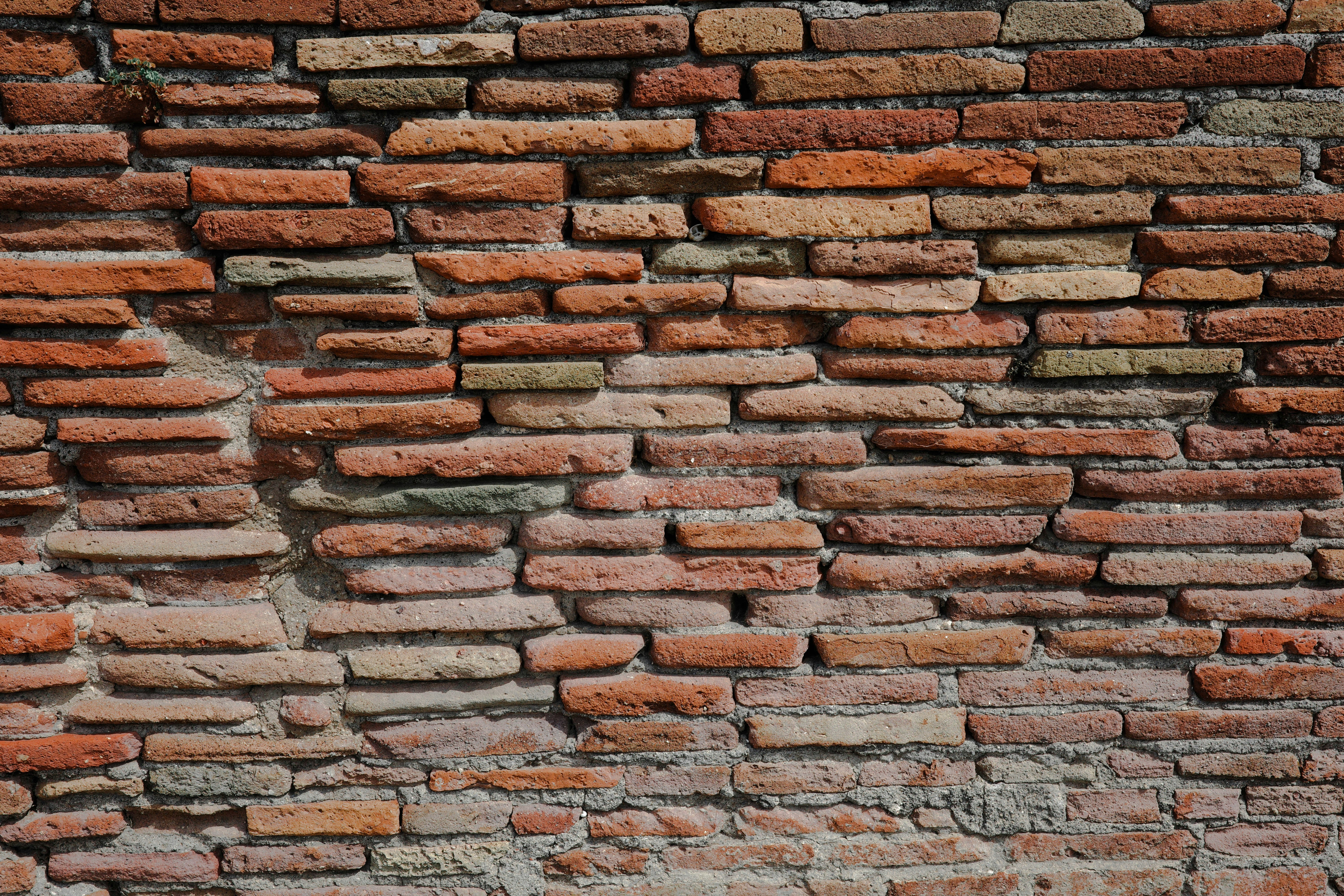 Weathered Brickwork: A Quiet Facade of Time
