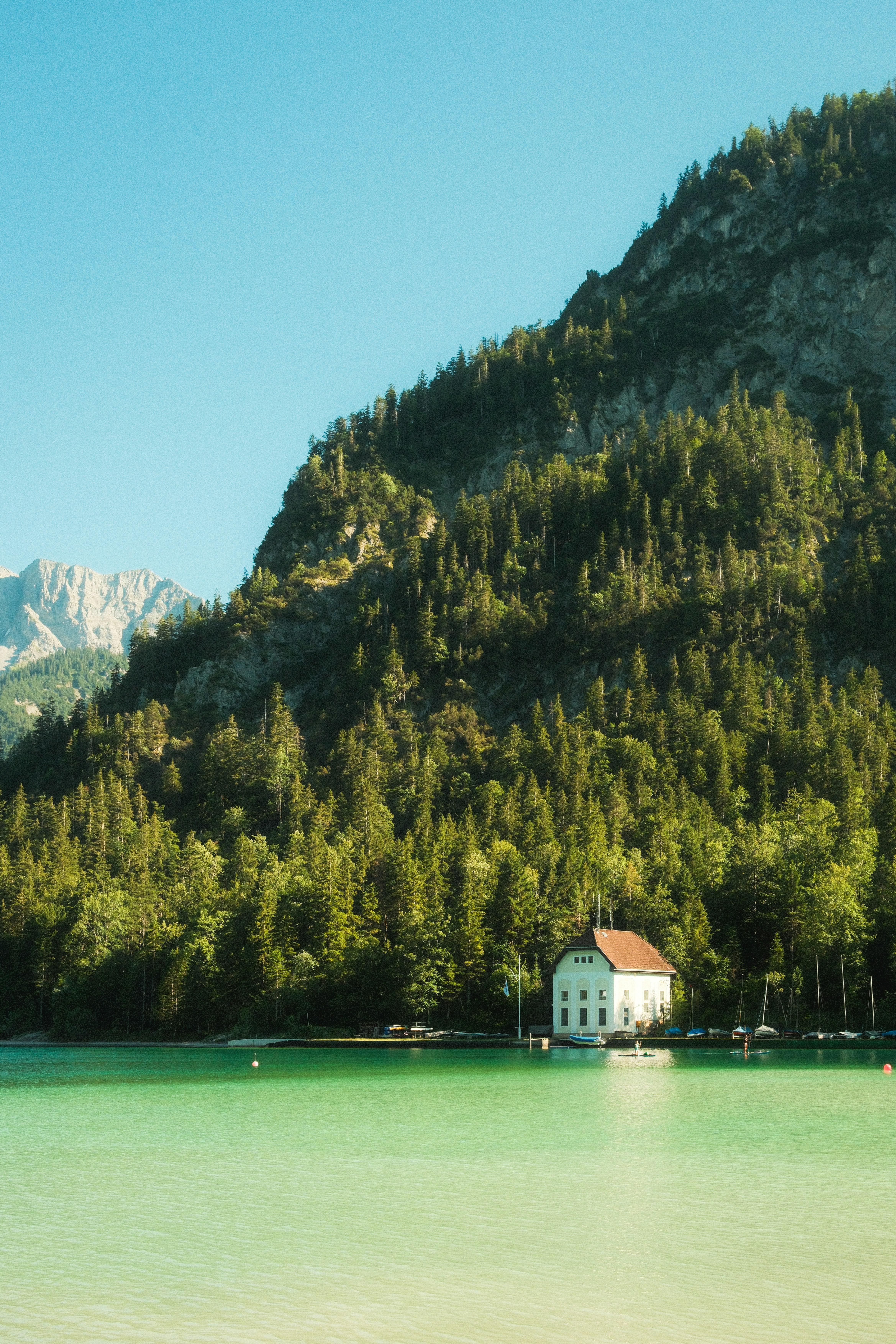 Lakeside Chalet Nestled at the Edge of Verdant Slopes