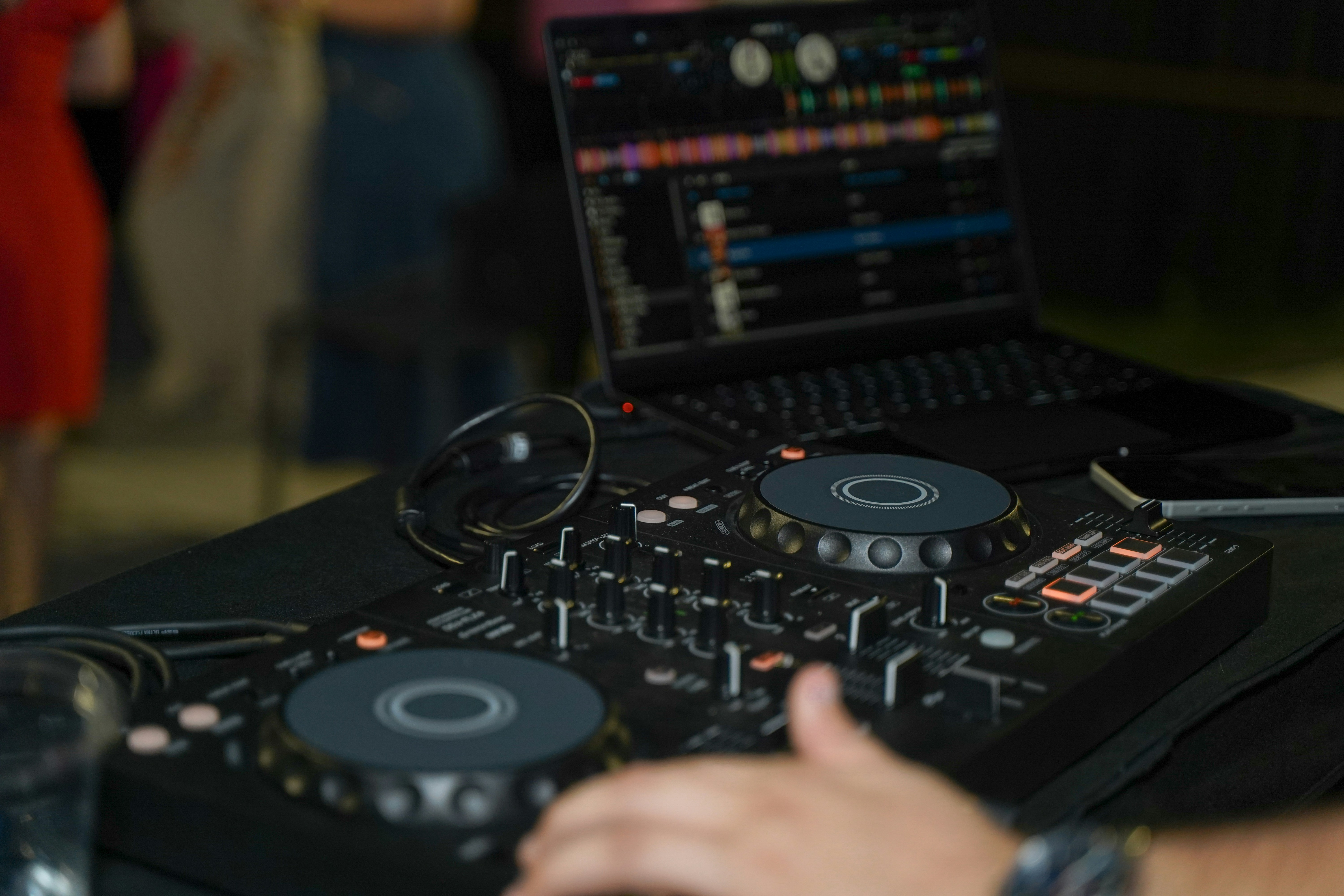 Midnight Pulse: DJ Console in Shadowed Spotlight