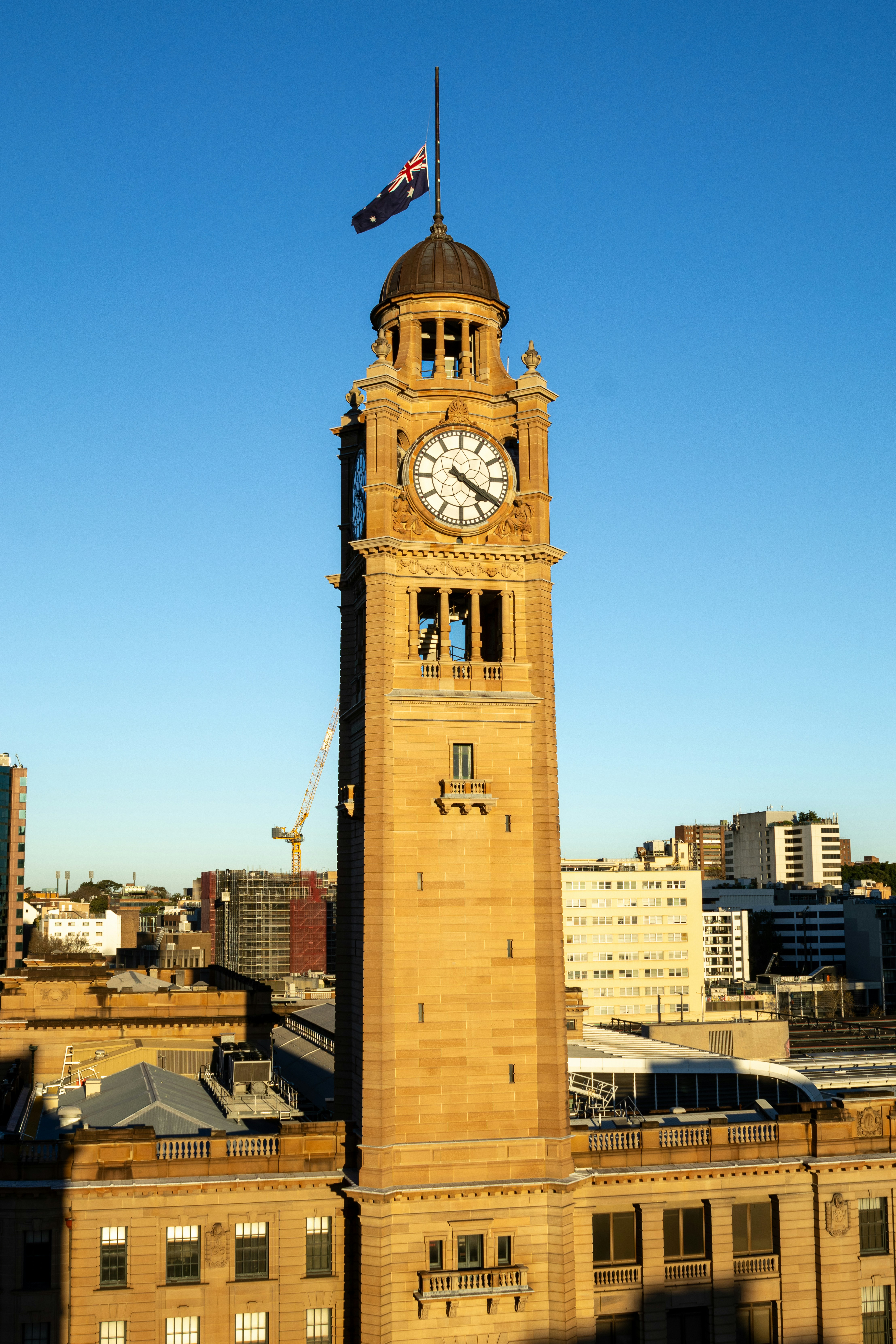 Golden Clock Tower Rising Above the City Skyline