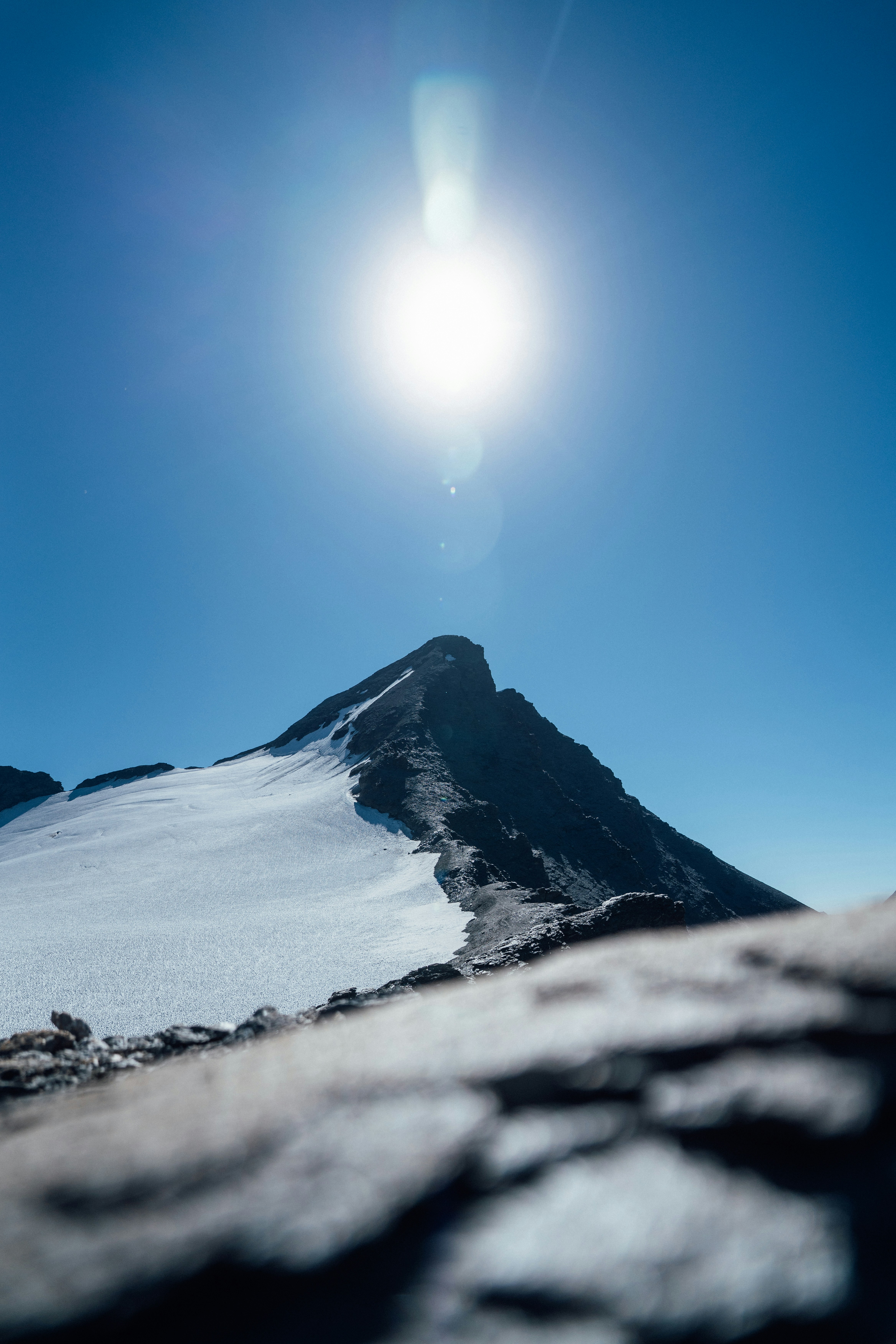 Sunlit Peak Under a Crytal Blue Sky