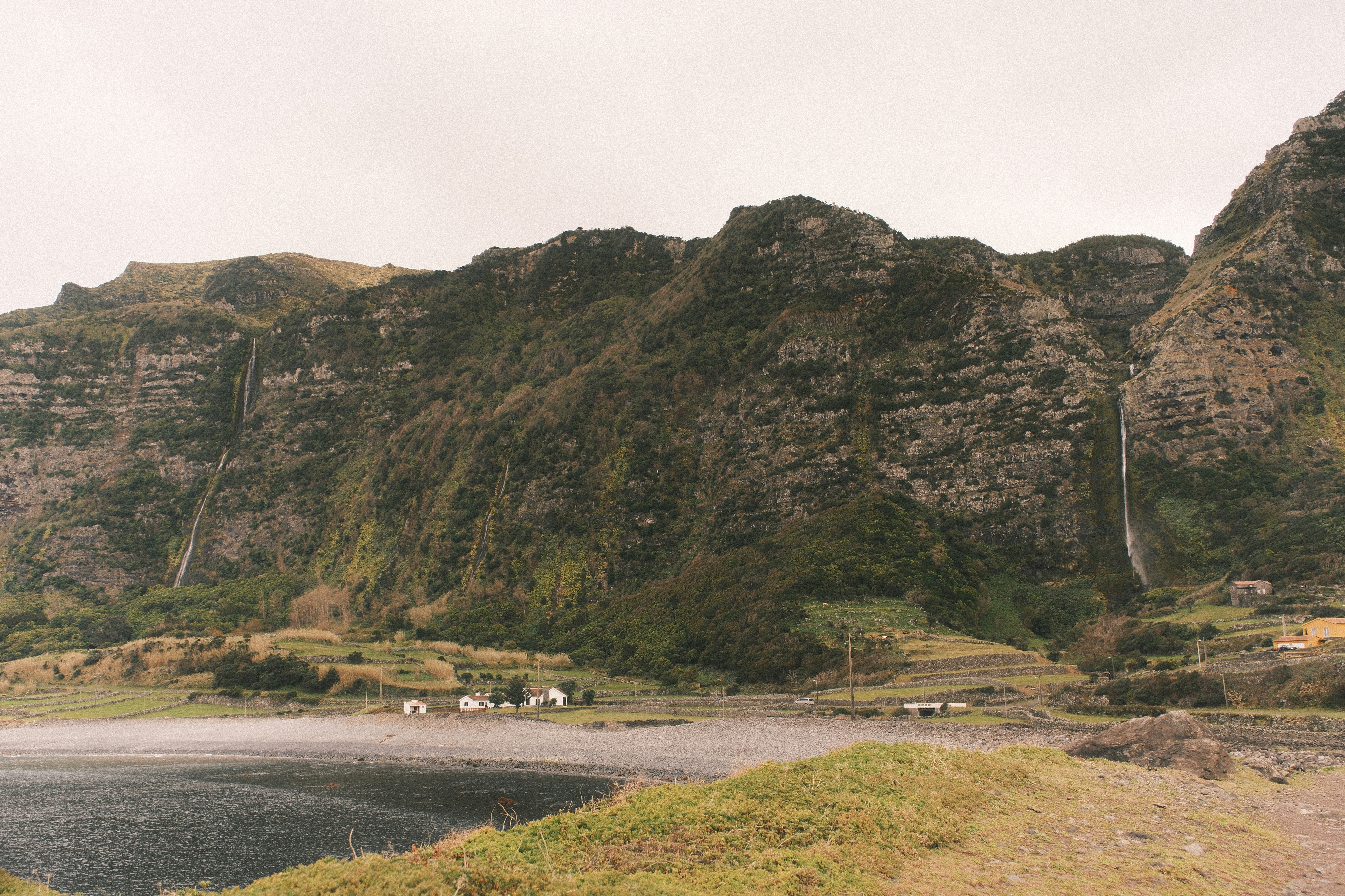 Sea Cliff Veil: A Quiet Coastal Inlet Beneath Weathered Cliffs