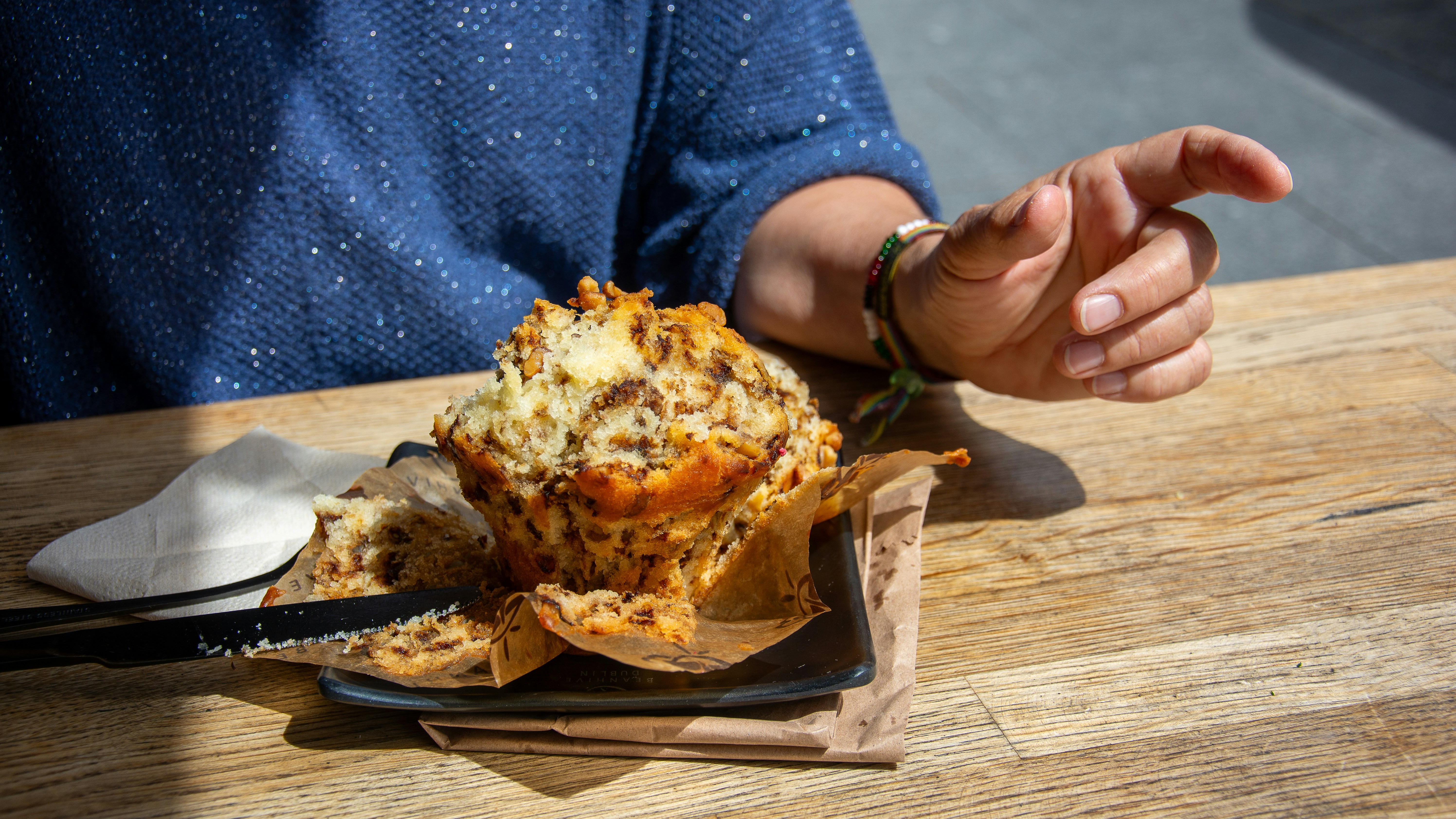 Crumbed Crown: A Hearty Pastry on a Wooden Table