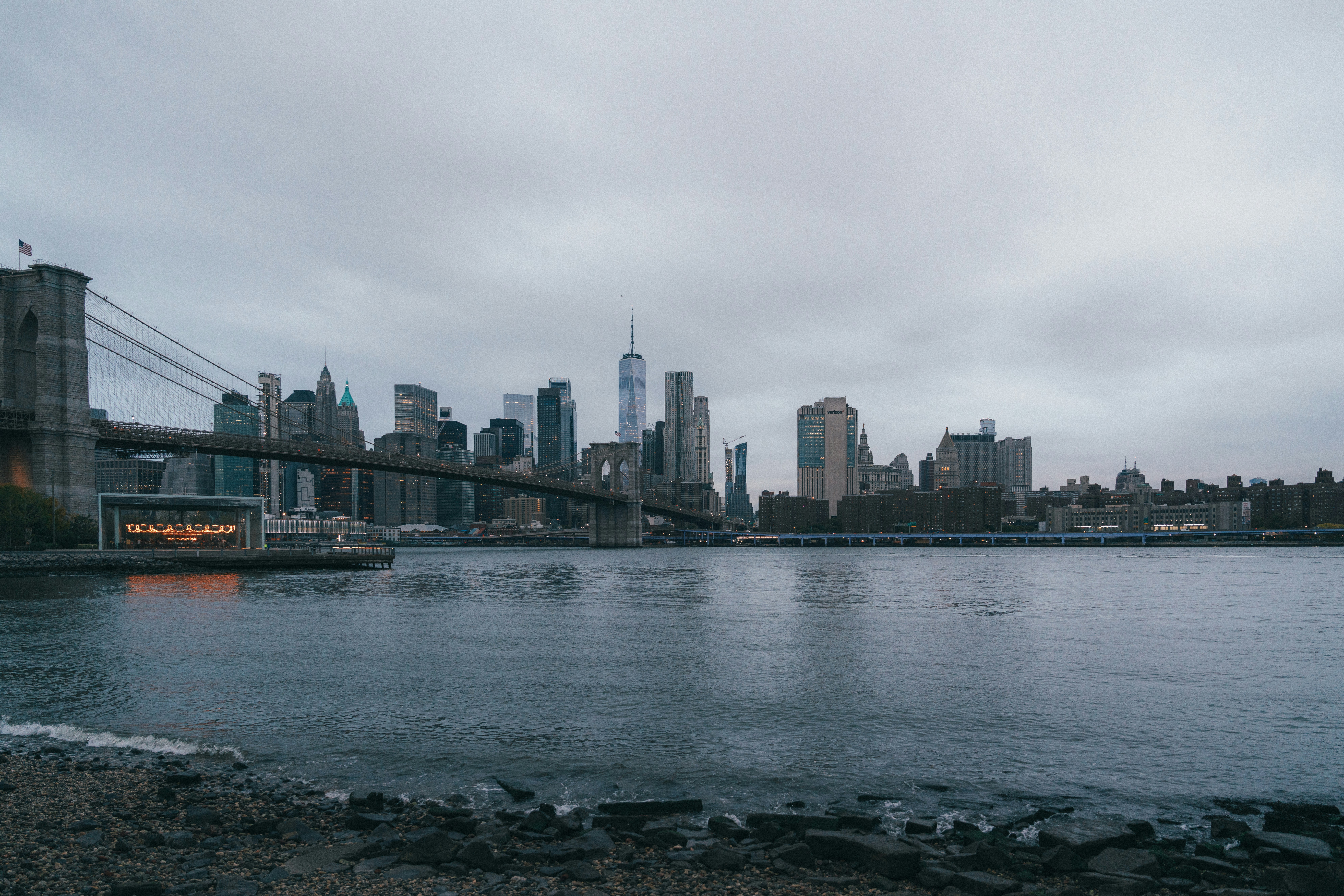 Cityscape on the Waterfront: Bridges, Skyscrapers, and a Quiet River