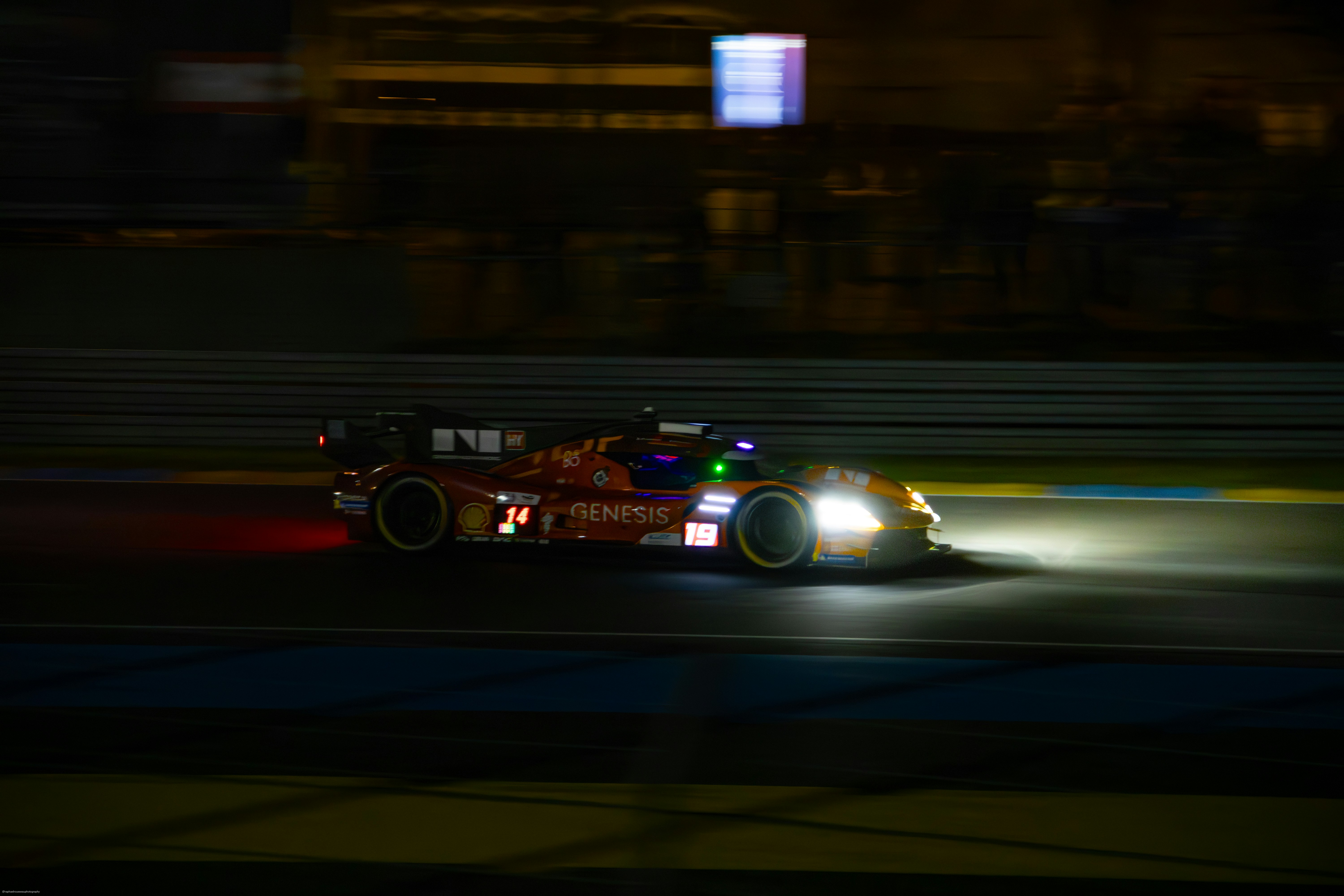 Midnight Le Mans: The Red Racing Target In a Blur of Neon