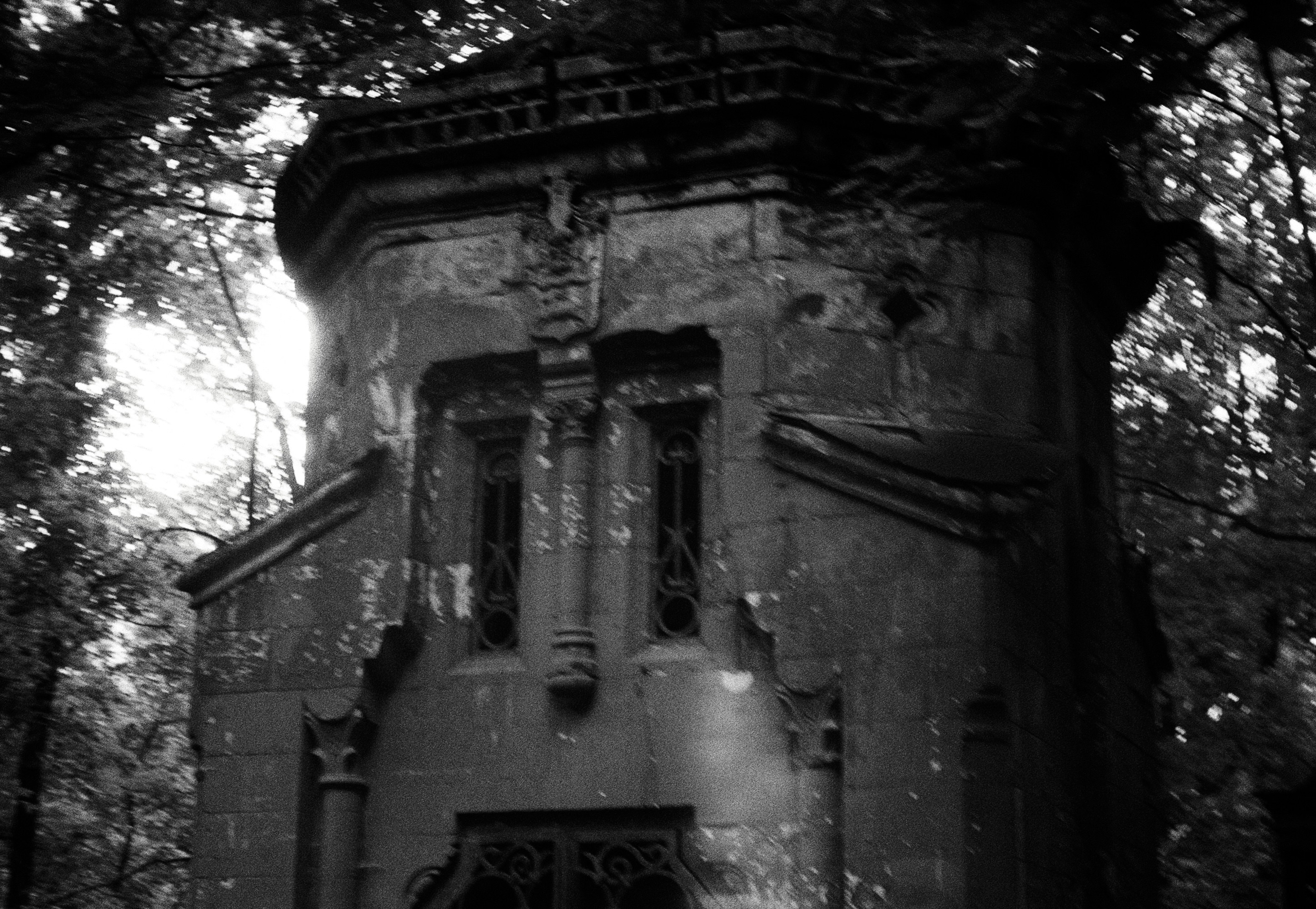 Midnight Mausoleum: A Weathered Monument in the Heart of the Woods