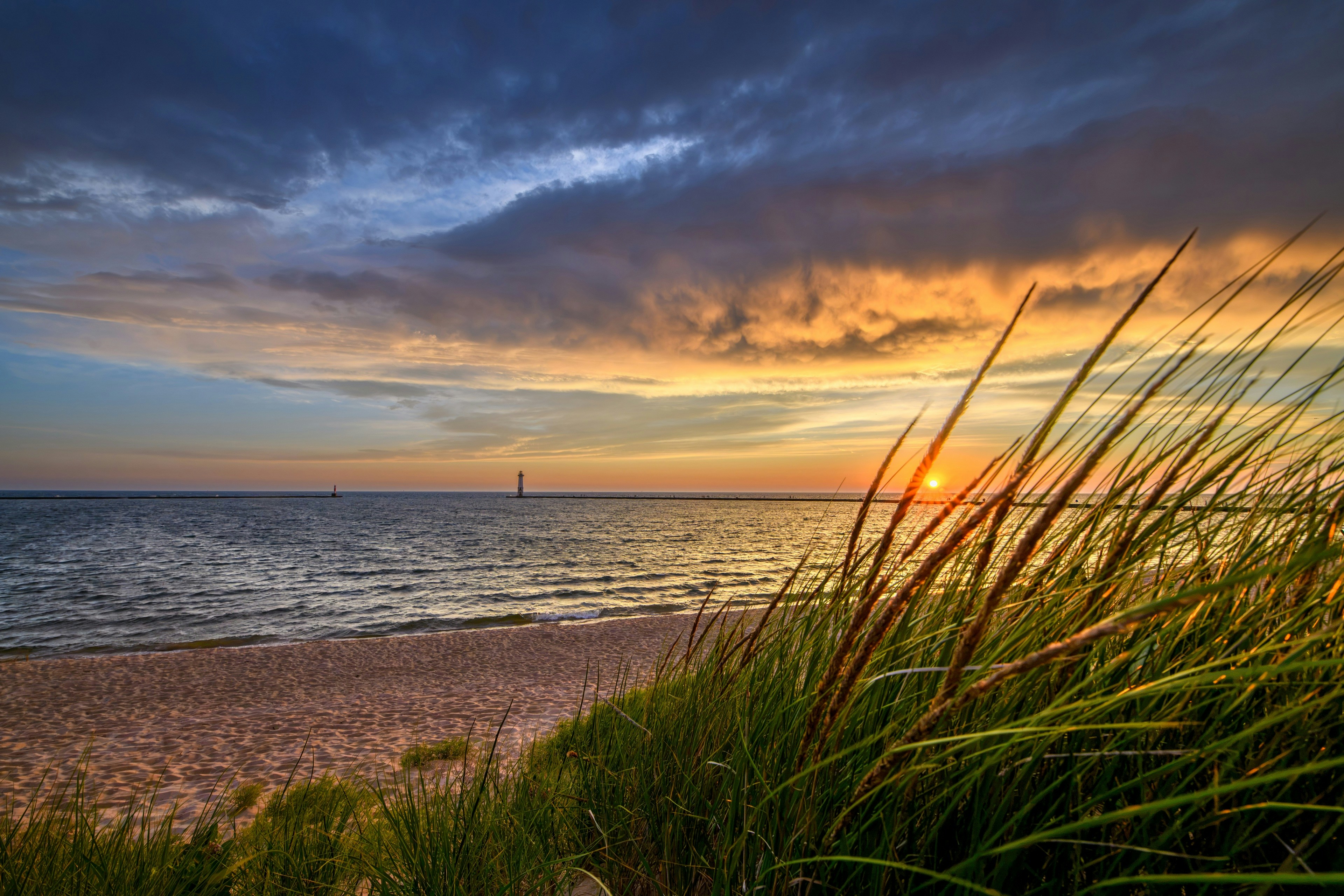 Sunset on the Dune: Sea Grass Framing the Golden Horizon