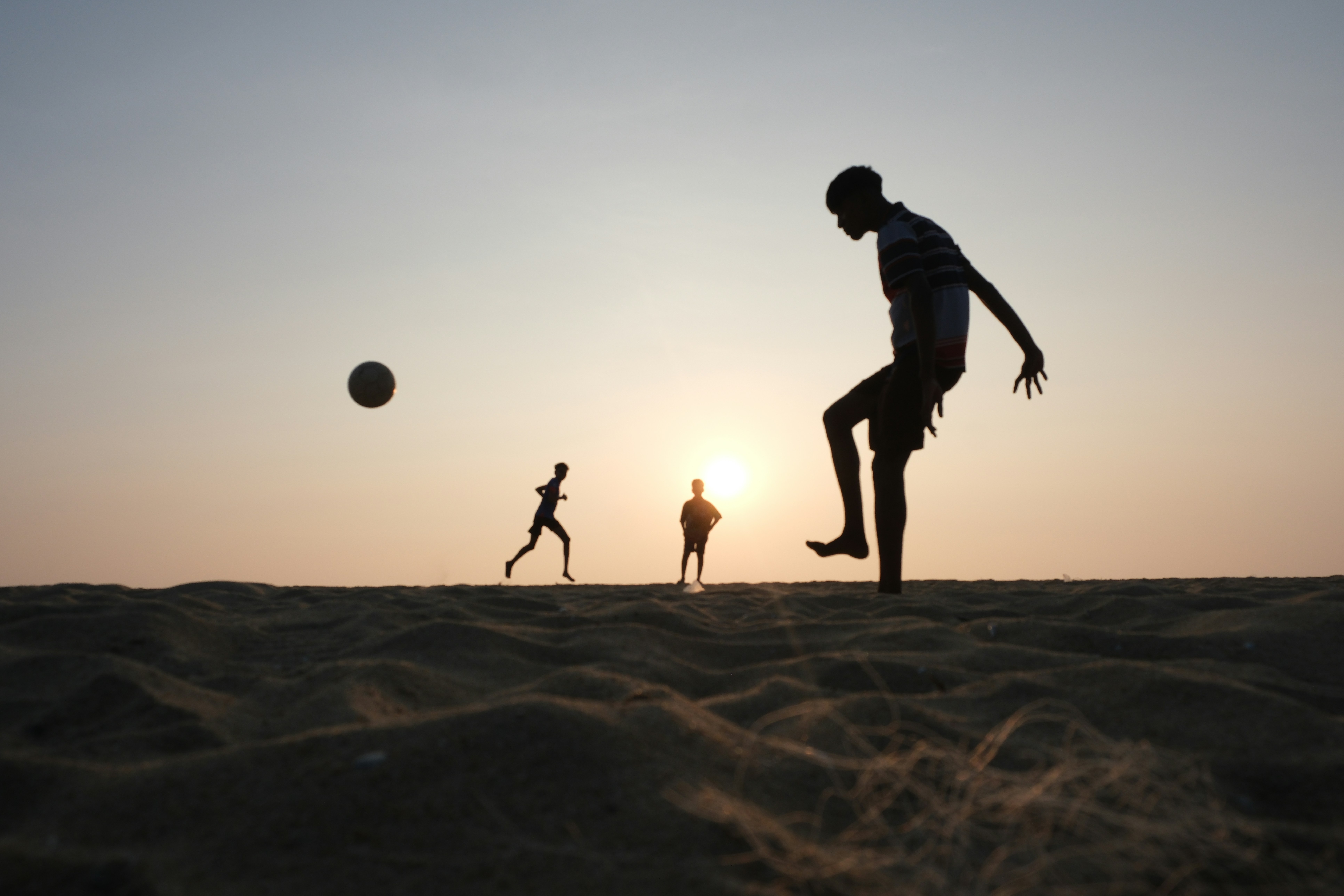 Silhouette Contest at Sunset on the Dune