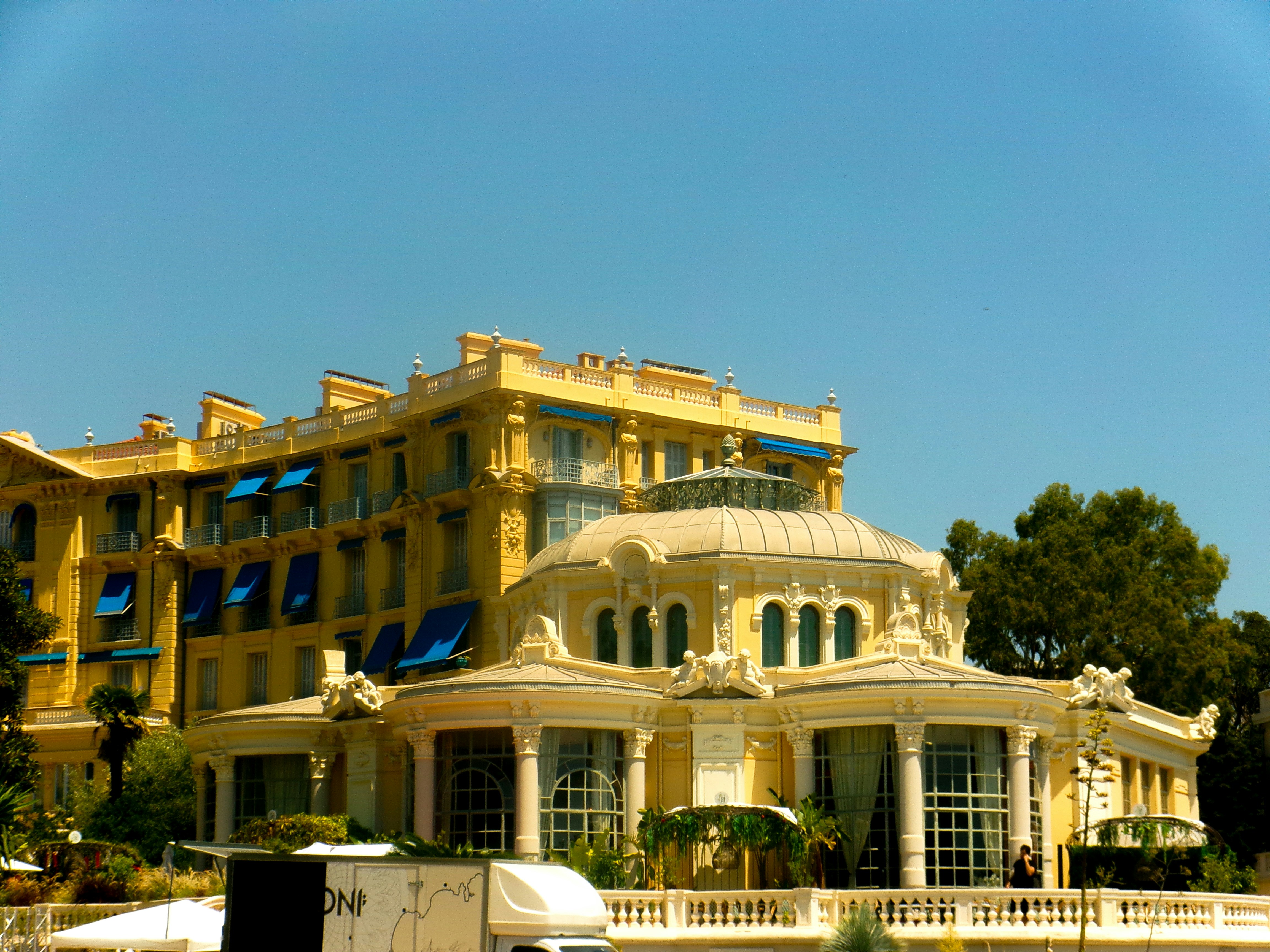 Ornate Venetian-style Conservatory Anchored by Golden Facade