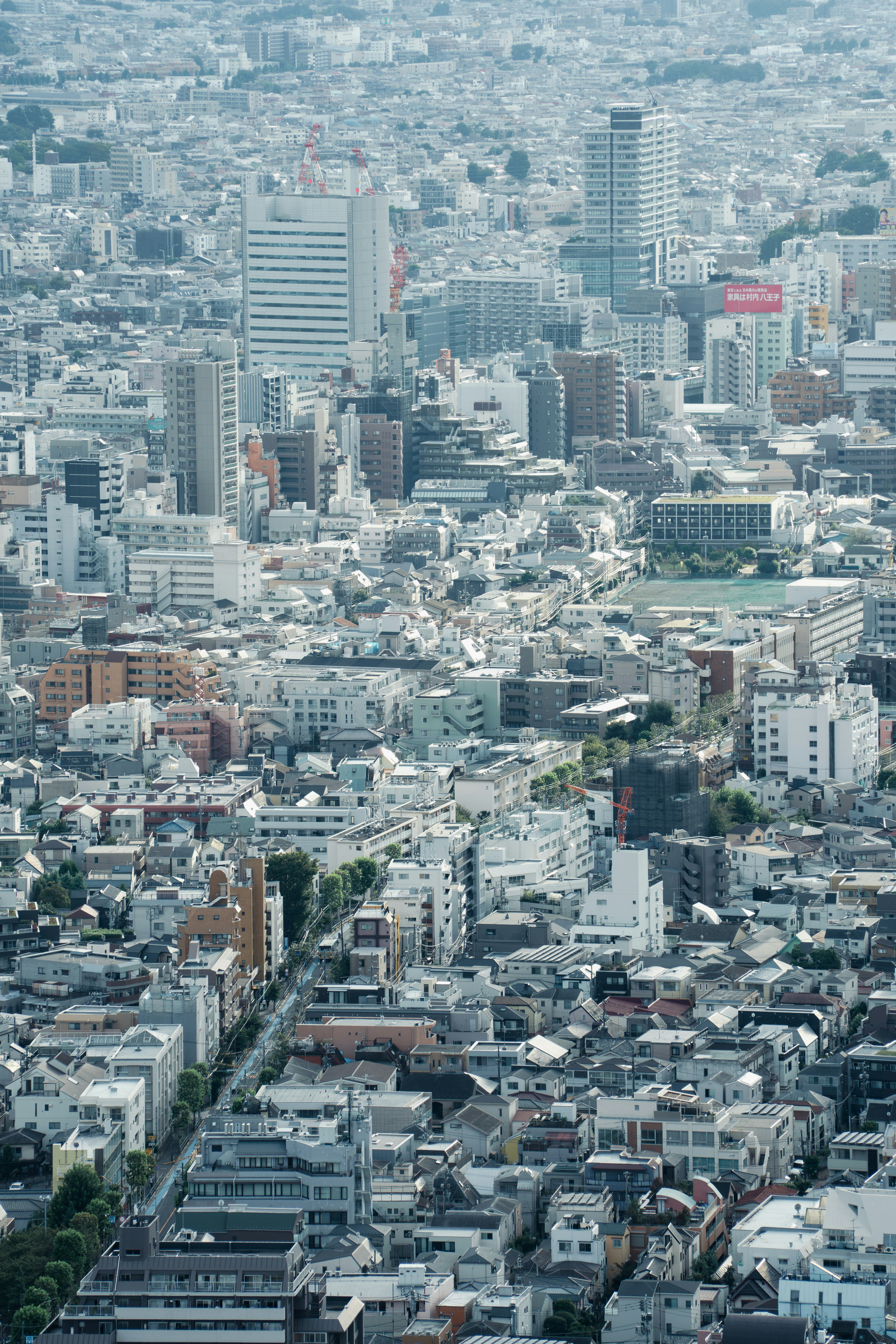 Urban Mosaic: Aerial Clarity Over a Dense City Grid