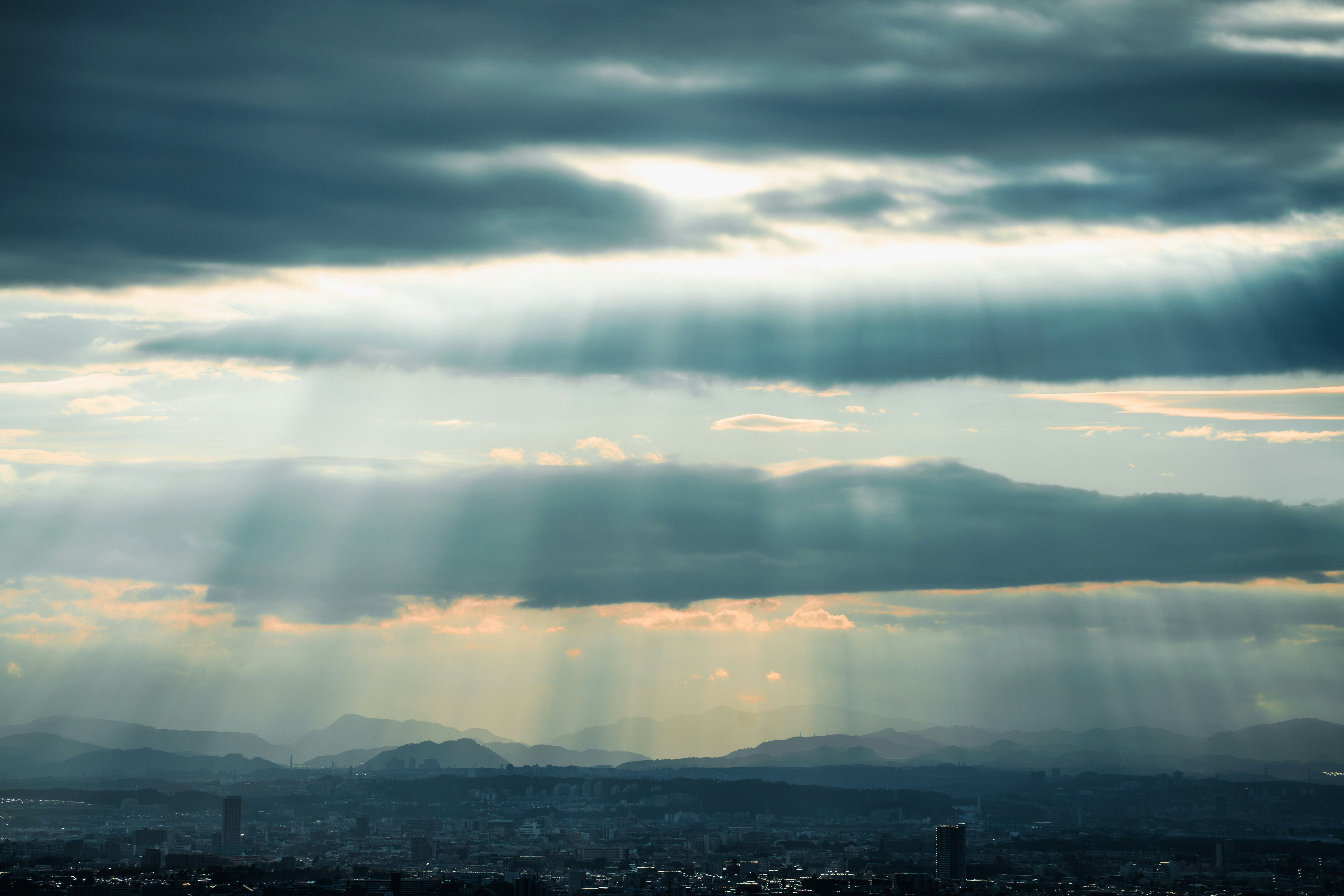 Rays of Light Over a Quiet City Horizon