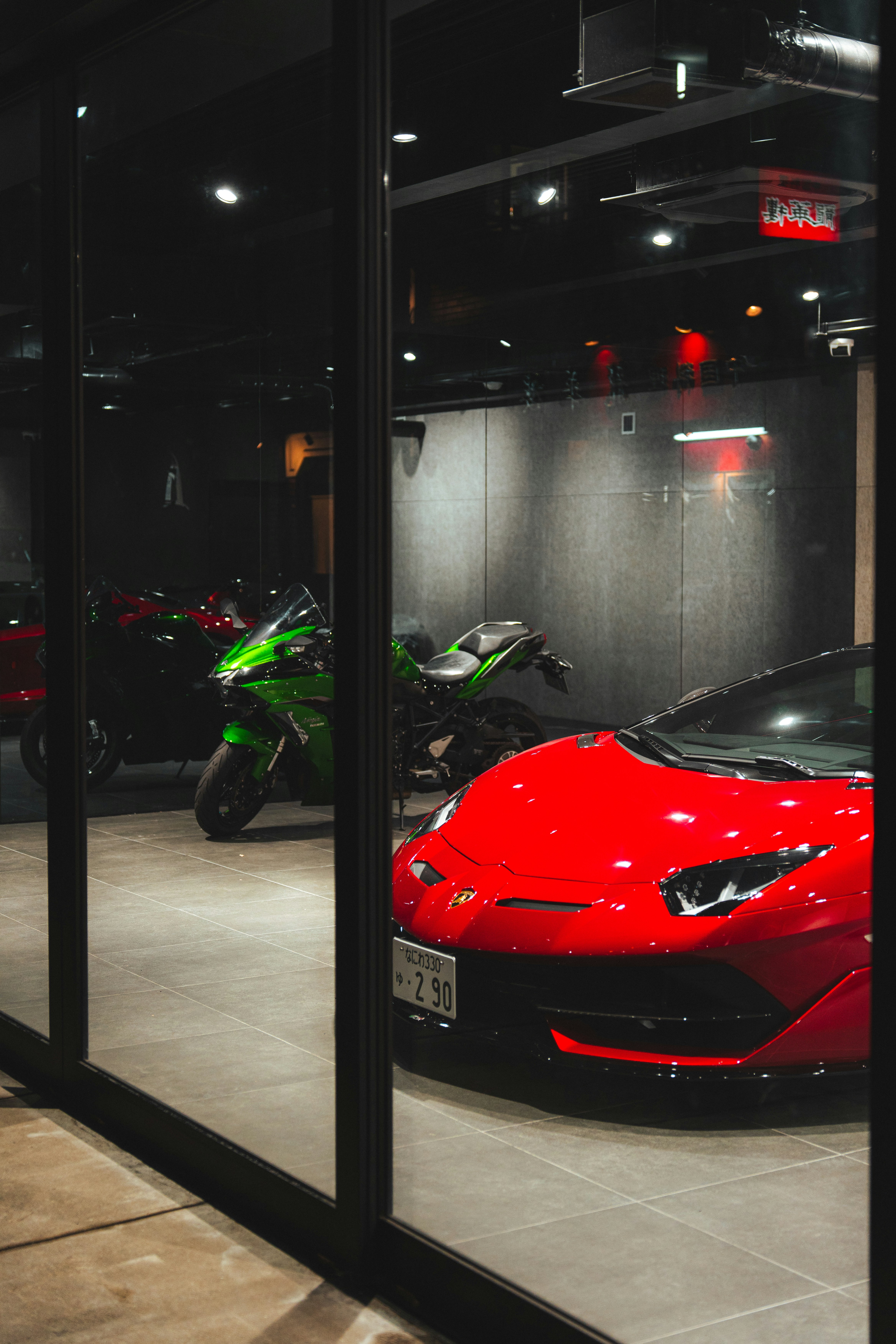 Red Panther in a Glass Box: A showroom of chrome and speed
