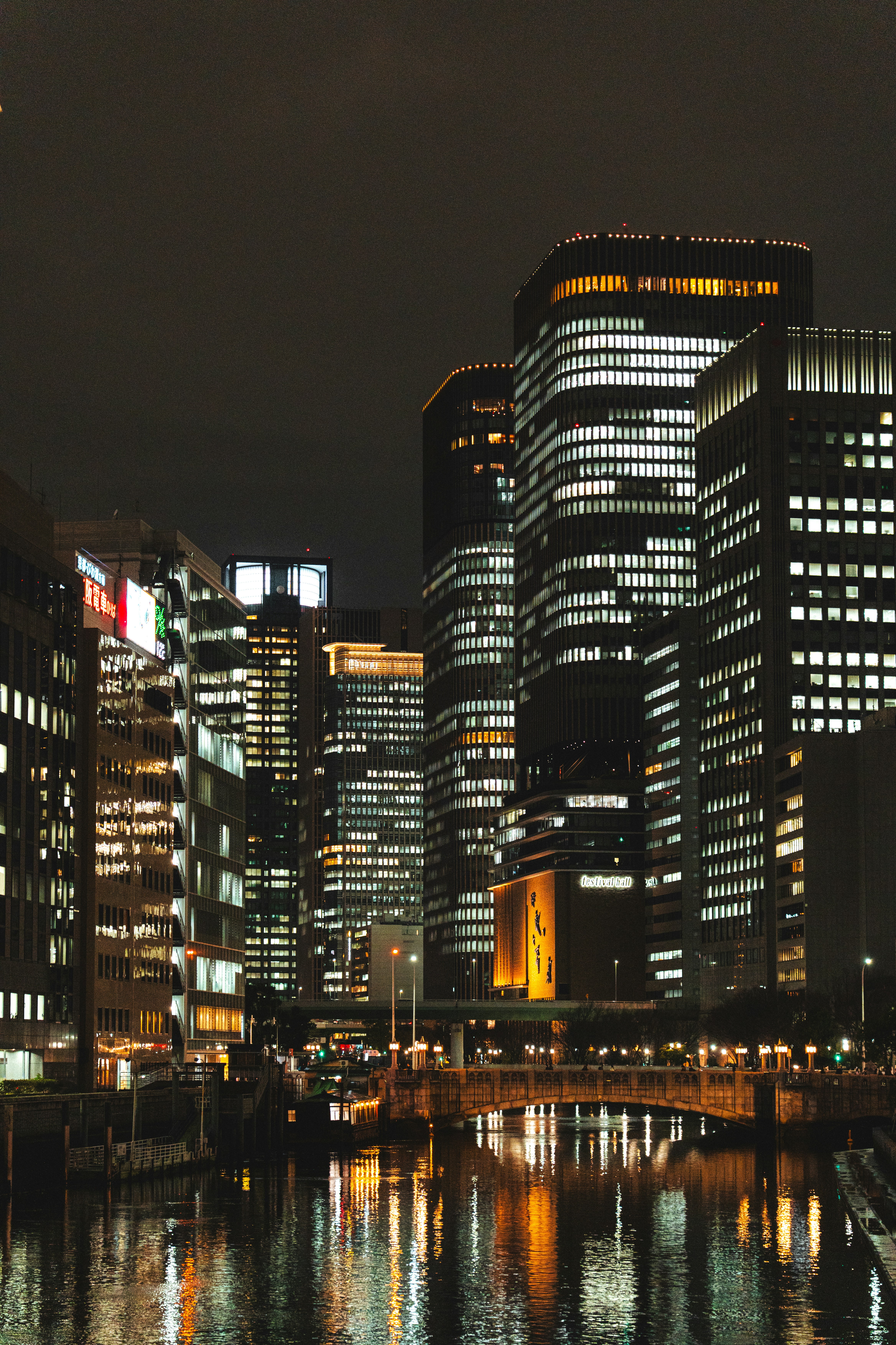 Midnight Skyline Over the Reflective Canal